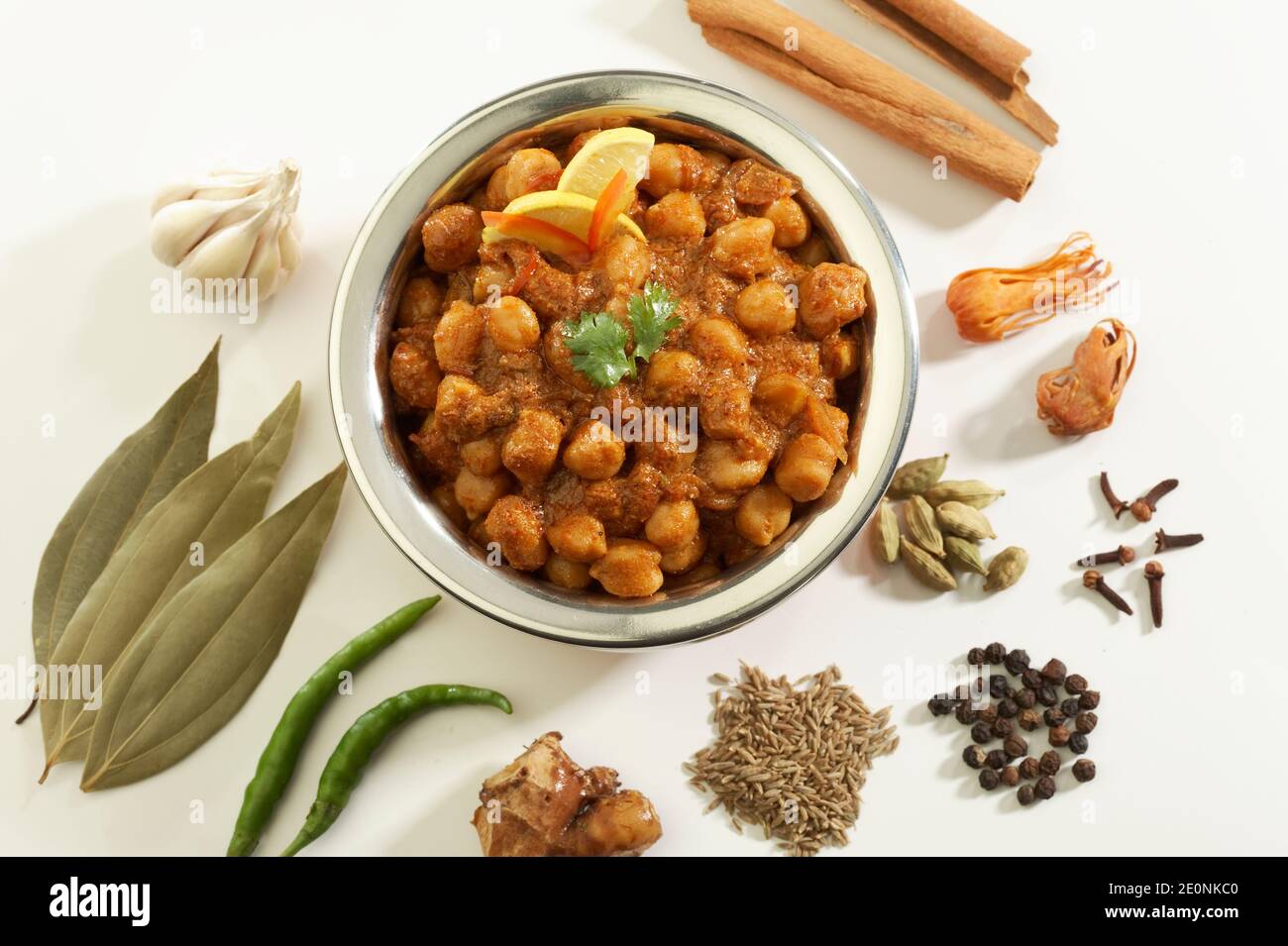 Indian food - chana masala with Indian spices, roti, puri Stock Photo ...
