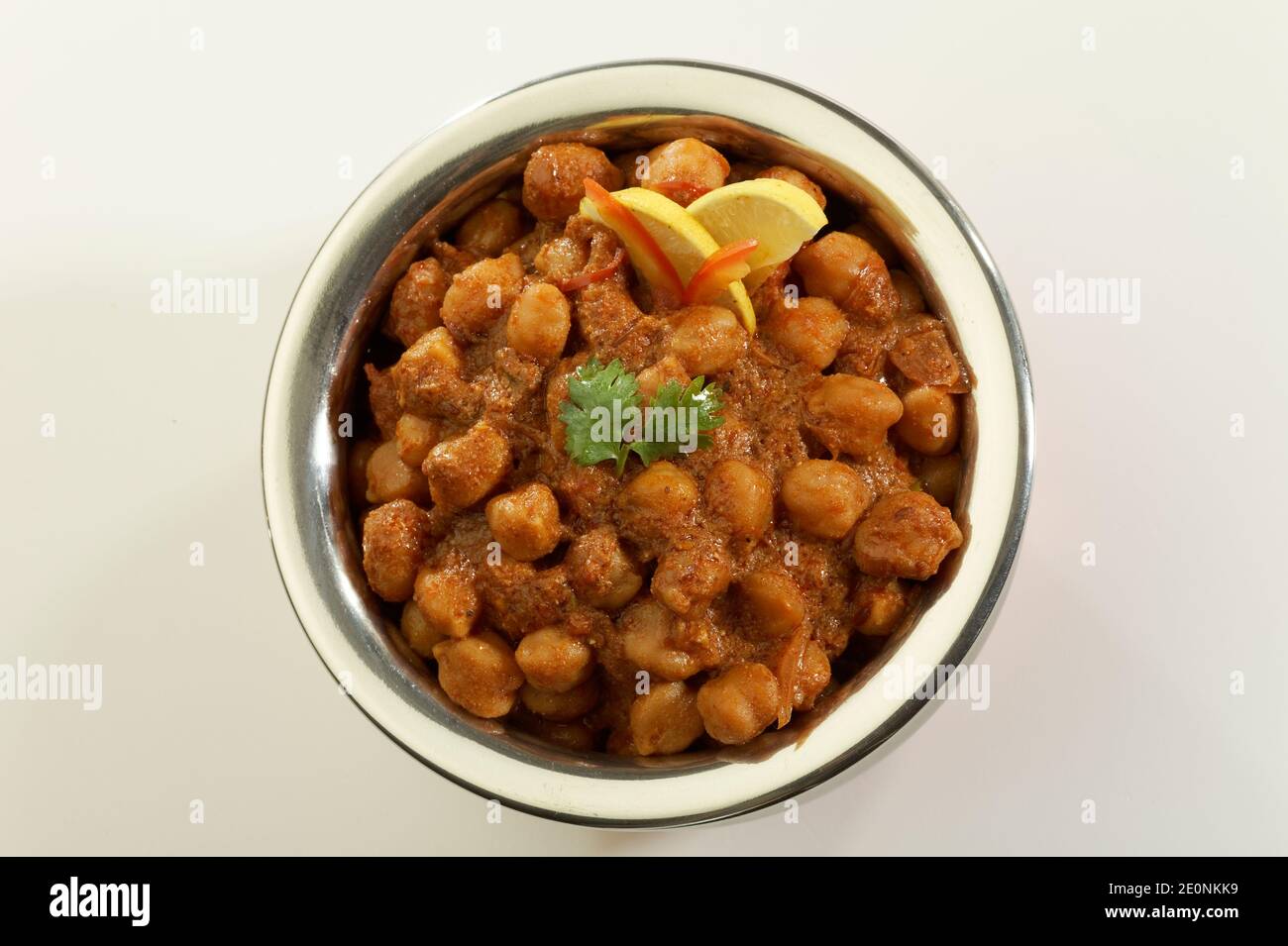 Indian food - chana masala with Indian spices, roti, puri Stock Photo ...