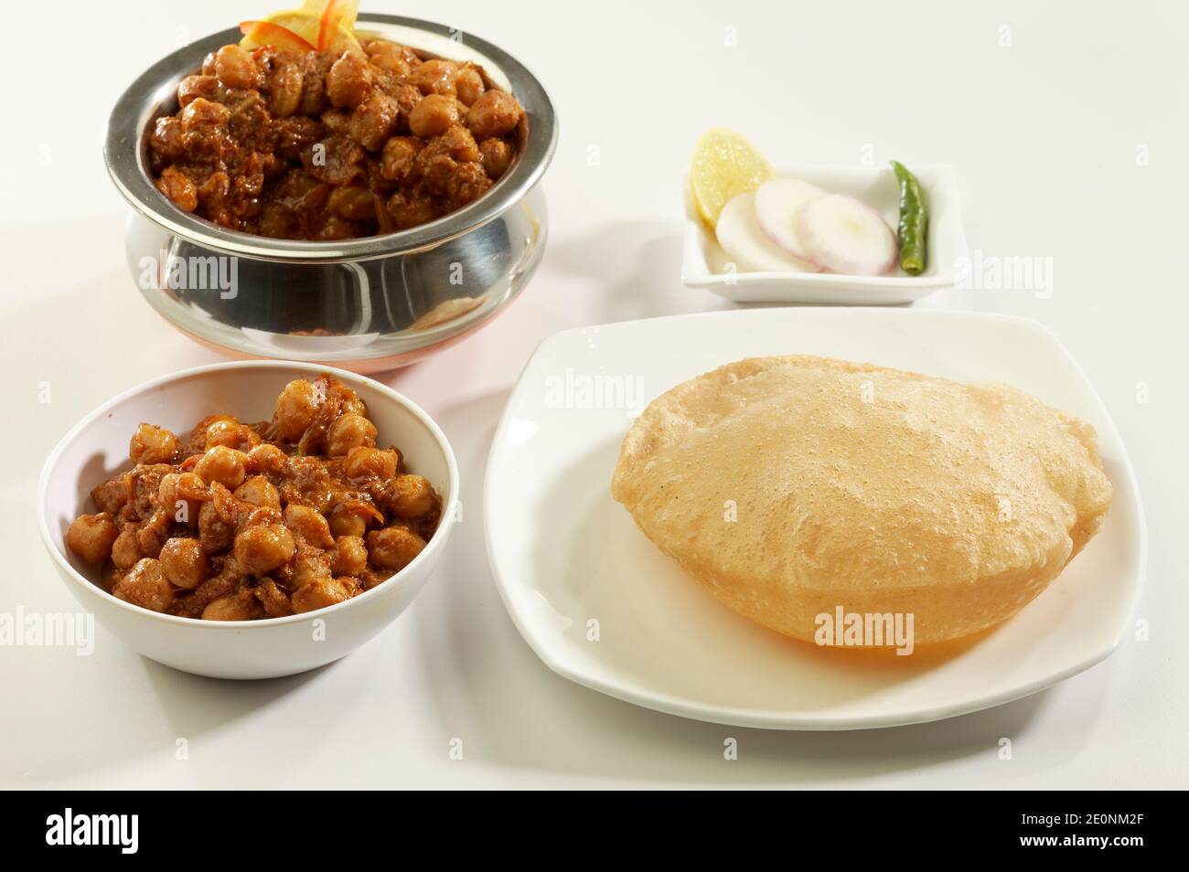 Indian food - chana masala with Indian spices, roti, puri Stock Photo ...