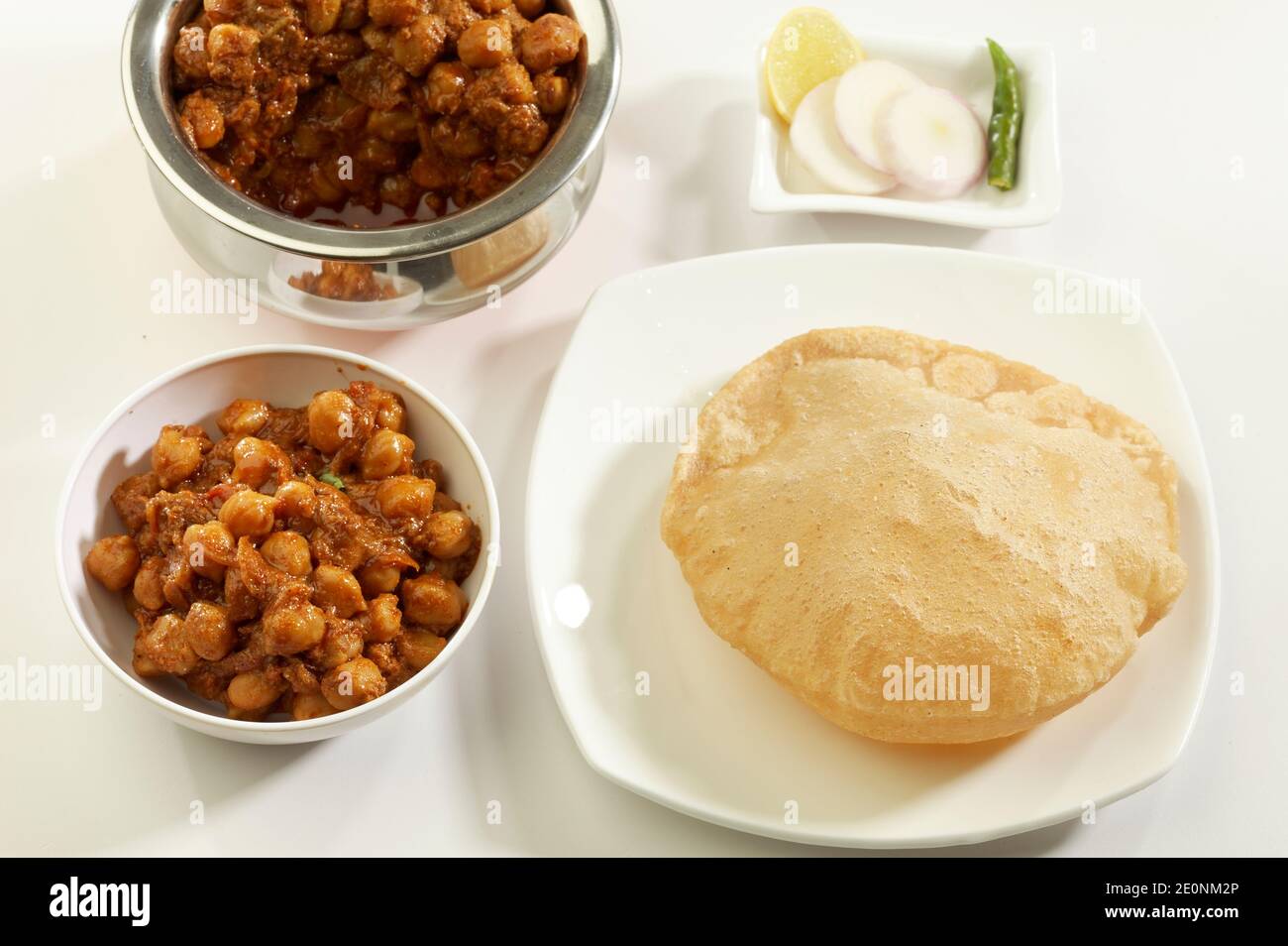 Indian food - chana masala with Indian spices, roti, puri Stock Photo ...
