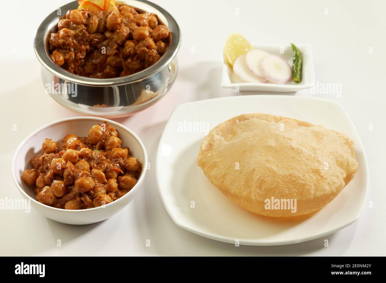 Indian food - chana masala with Indian spices, roti, puri Stock Photo ...