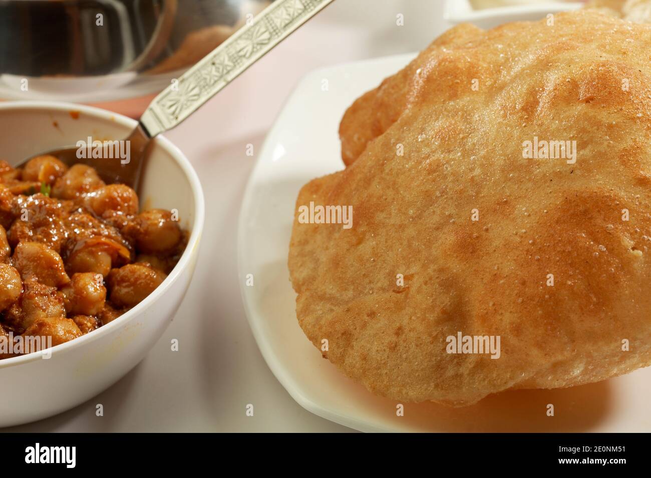 Indian food - chana masala with Indian spices, roti, puri Stock Photo ...