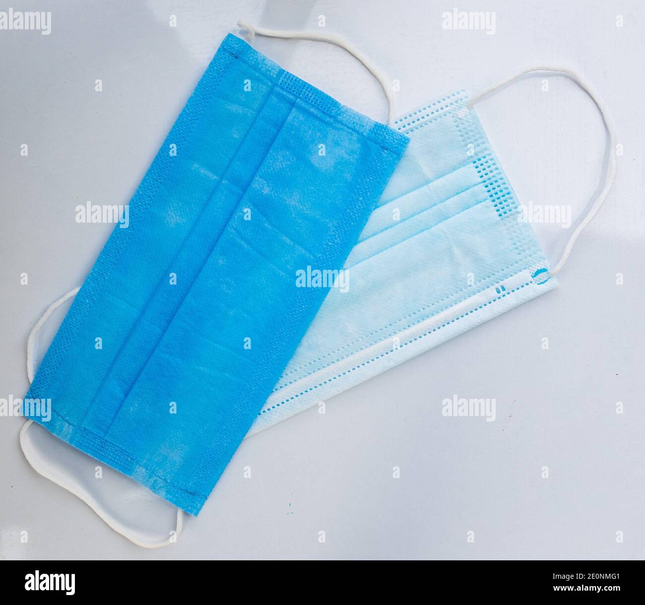 Blue surgical masks hi-res stock photography and images - Alamy