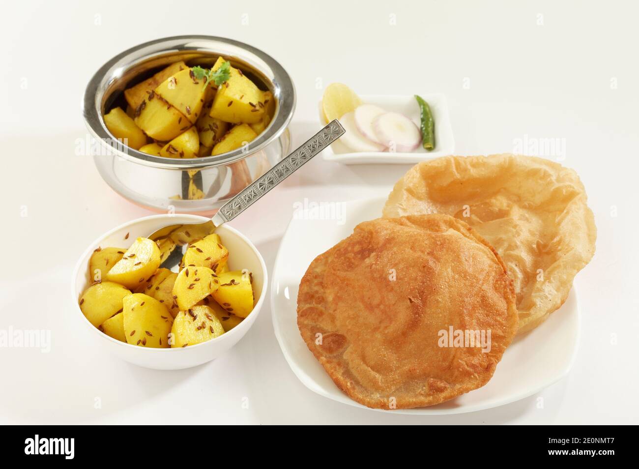 Indian food-cooked spicy potato preparation , chapati, puri, tadka ...