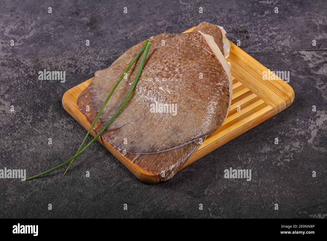 Raw stingray wings tasty fillet for cooking Stock Photo - Alamy