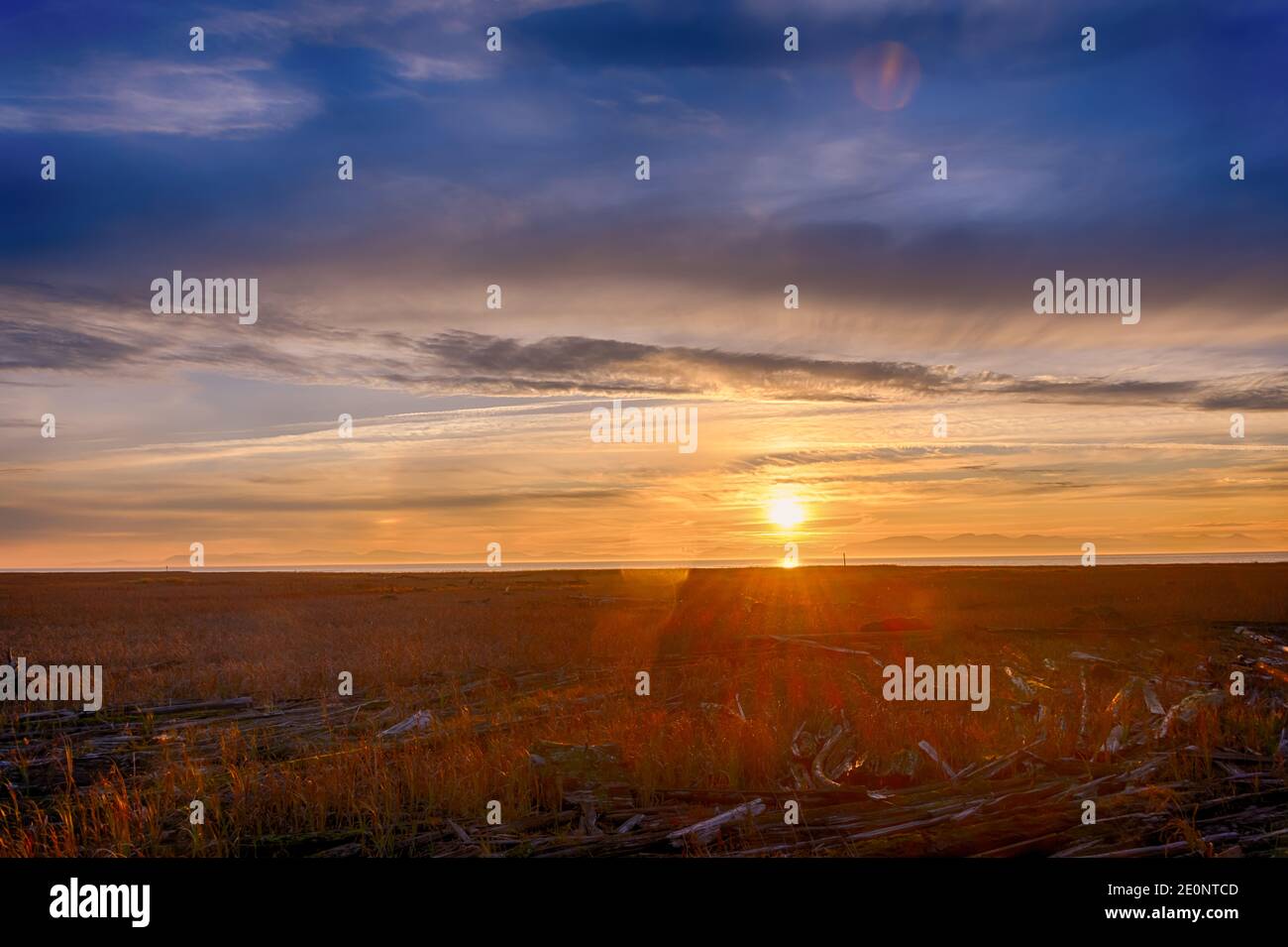 Lens flare in mountains orange hi-res stock photography and images - Alamy