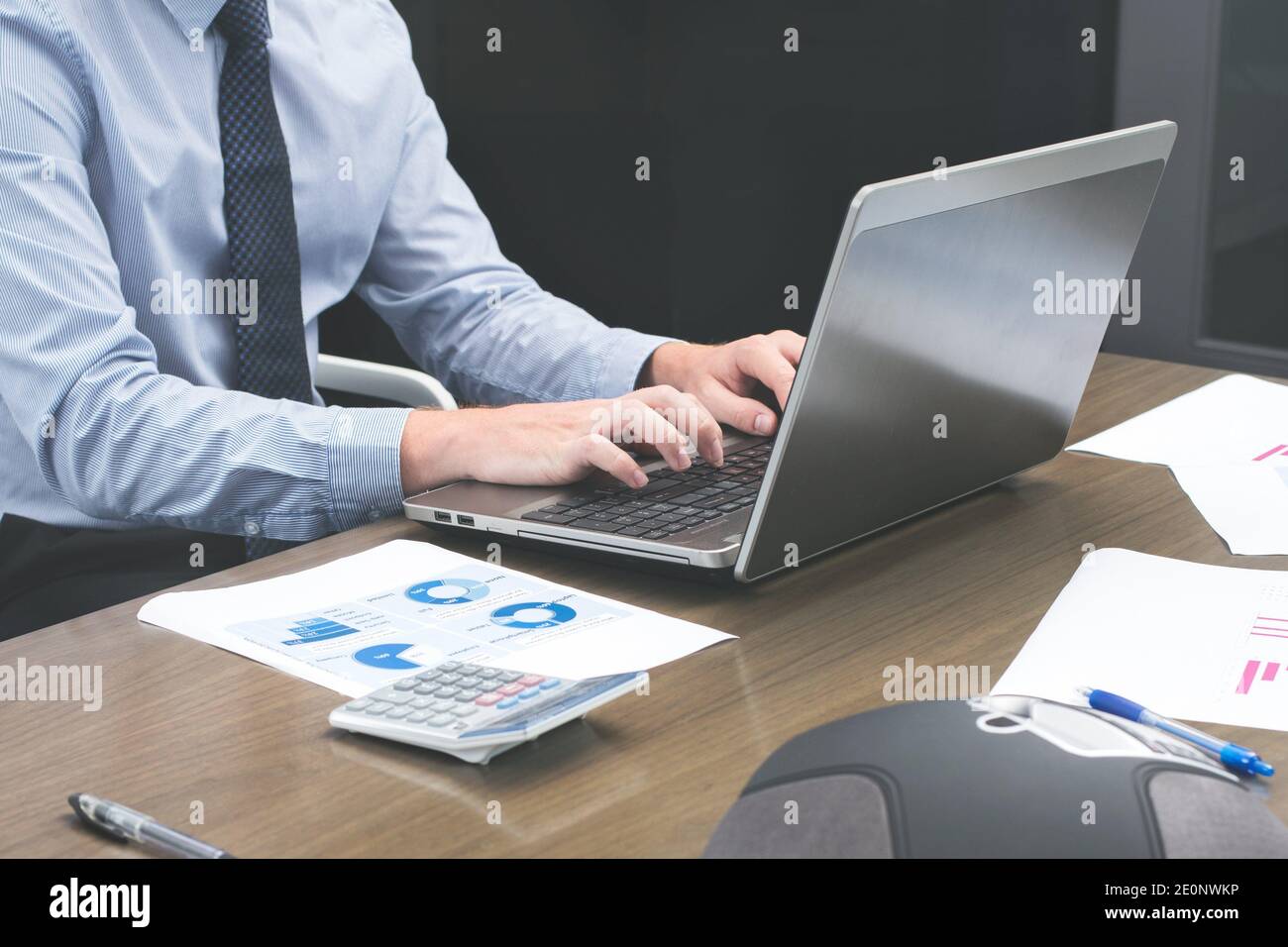 office staff typing on laptop Stock Photo - Alamy