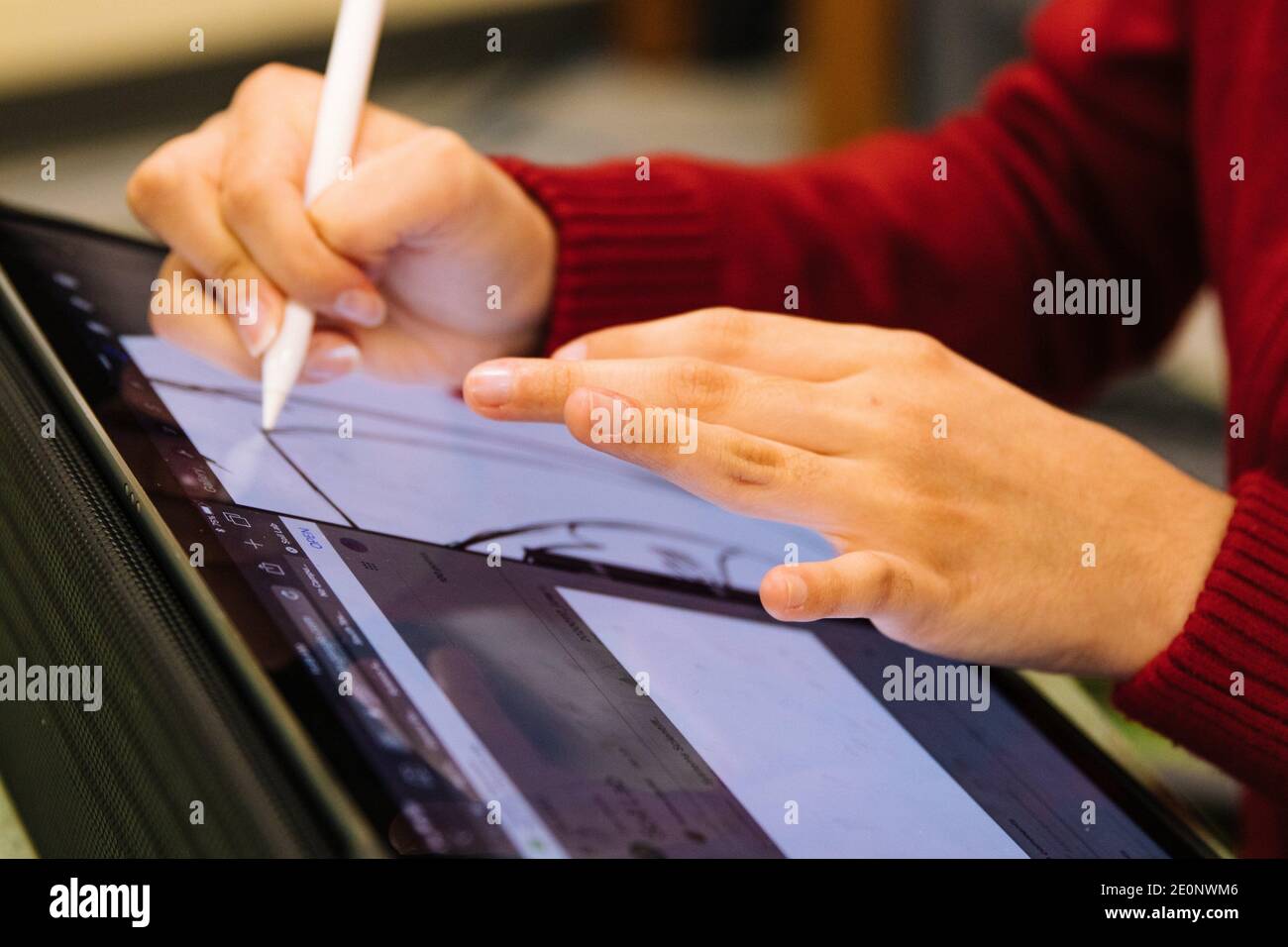 person using pencil to design on tablet Stock Photo - Alamy