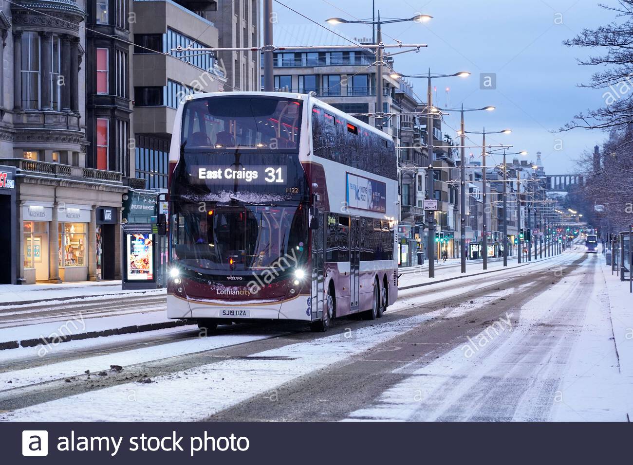Buses in snow hi-res stock photography and images - Alamy