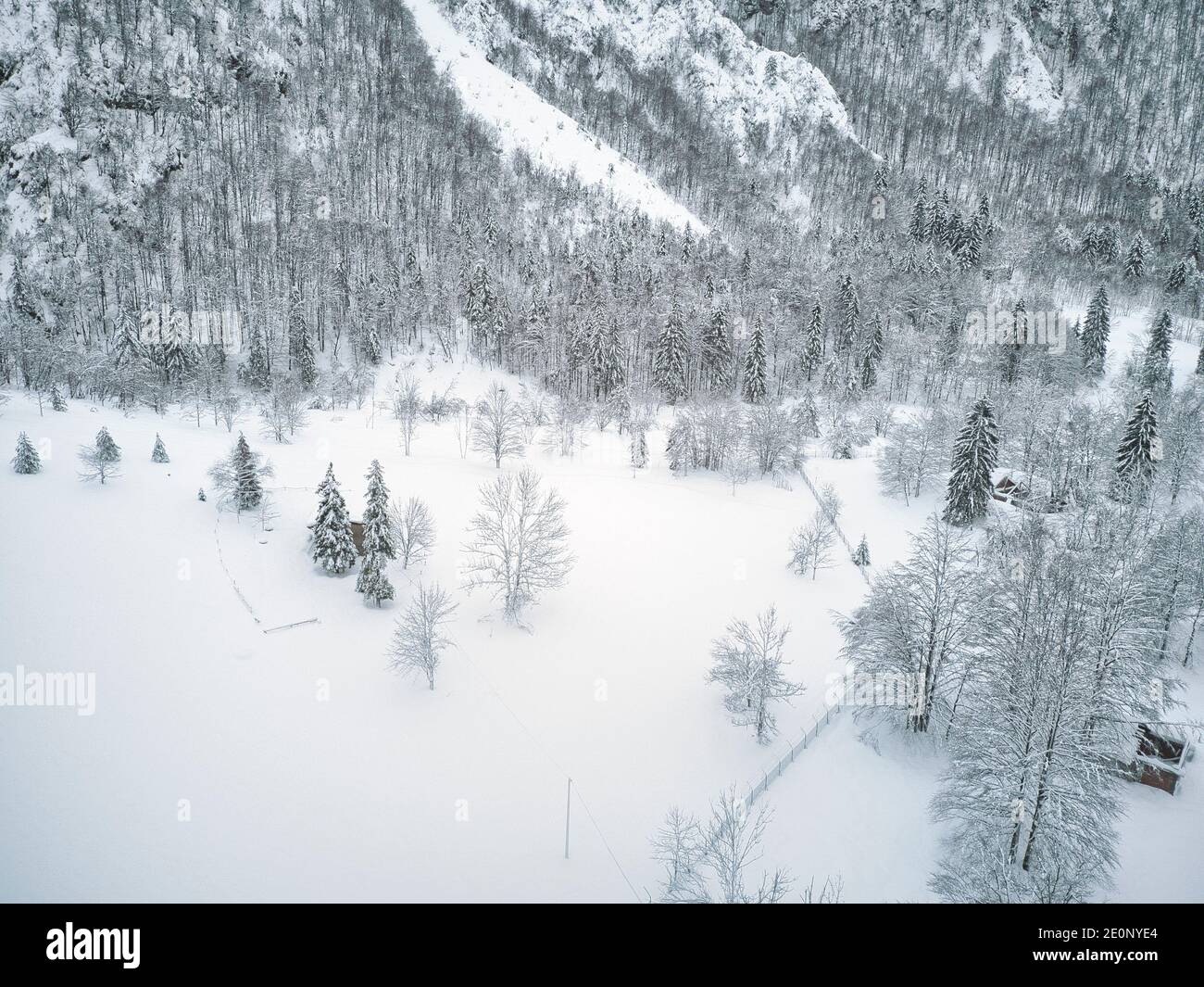 During the snowfall in the mountains. View from above Stock Photo - Alamy
