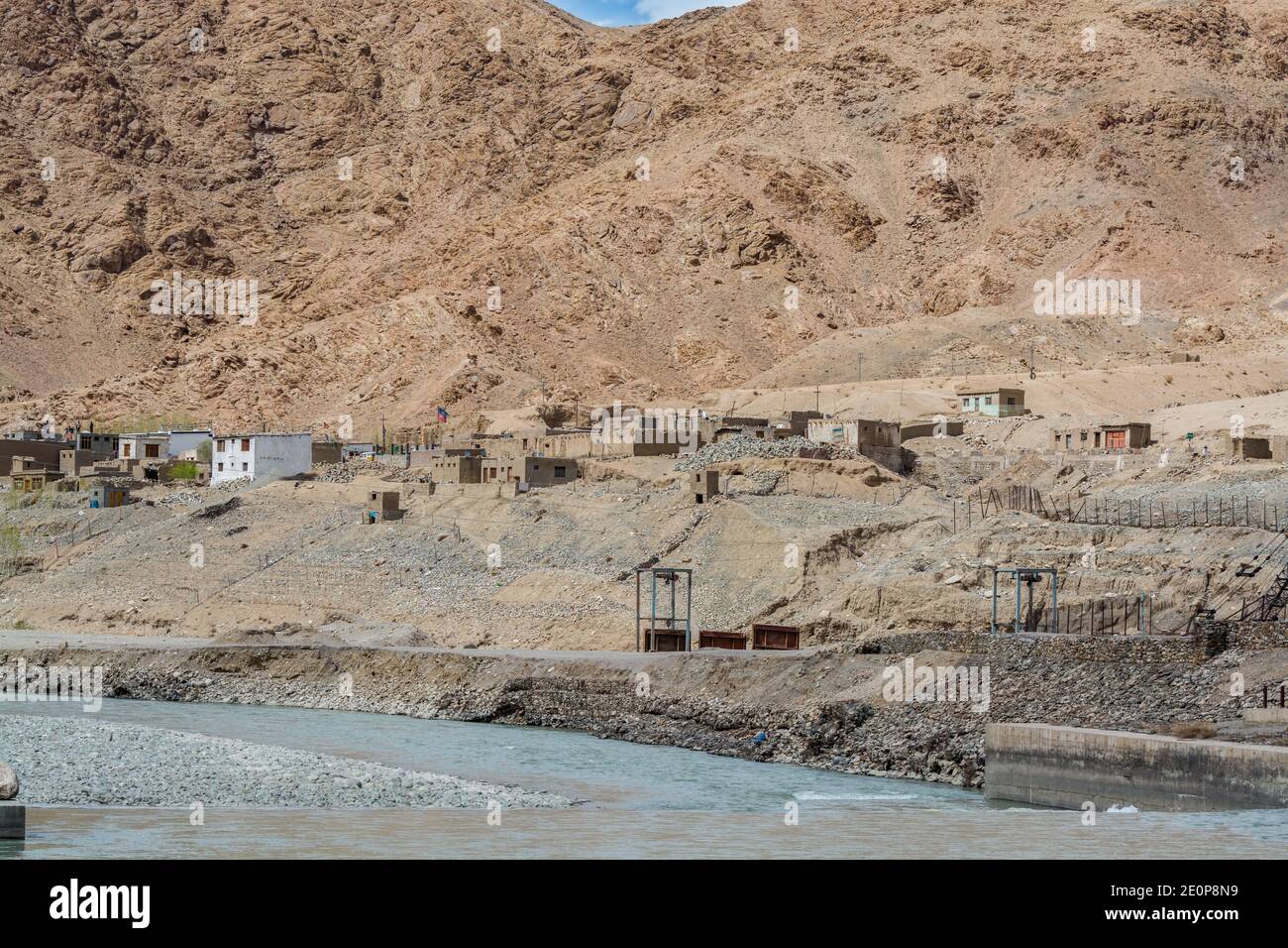 Traditional Tibetan village at the bank of Indus river, bottom of ...