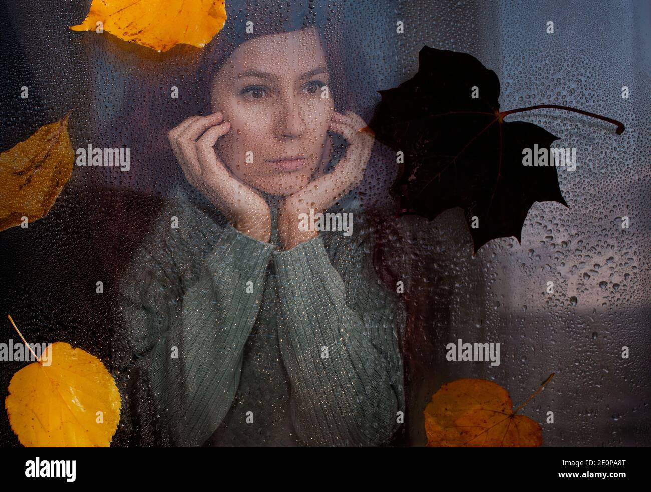 Sad woman silhouette window hi-res stock photography and images - Alamy