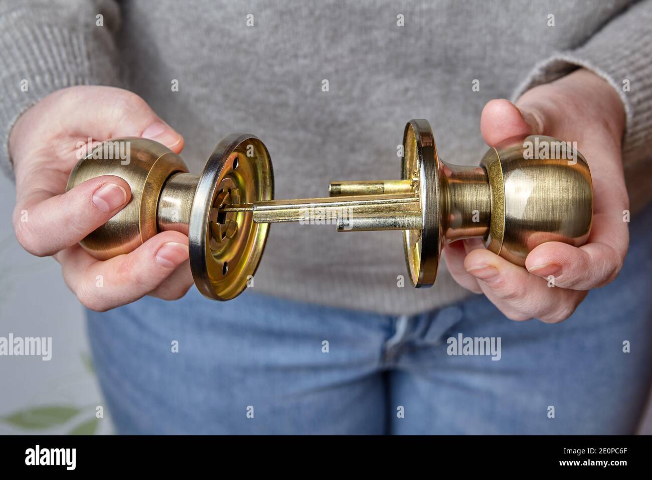 Mechanism with a spindle from a new brass door handle with a latch and ...
