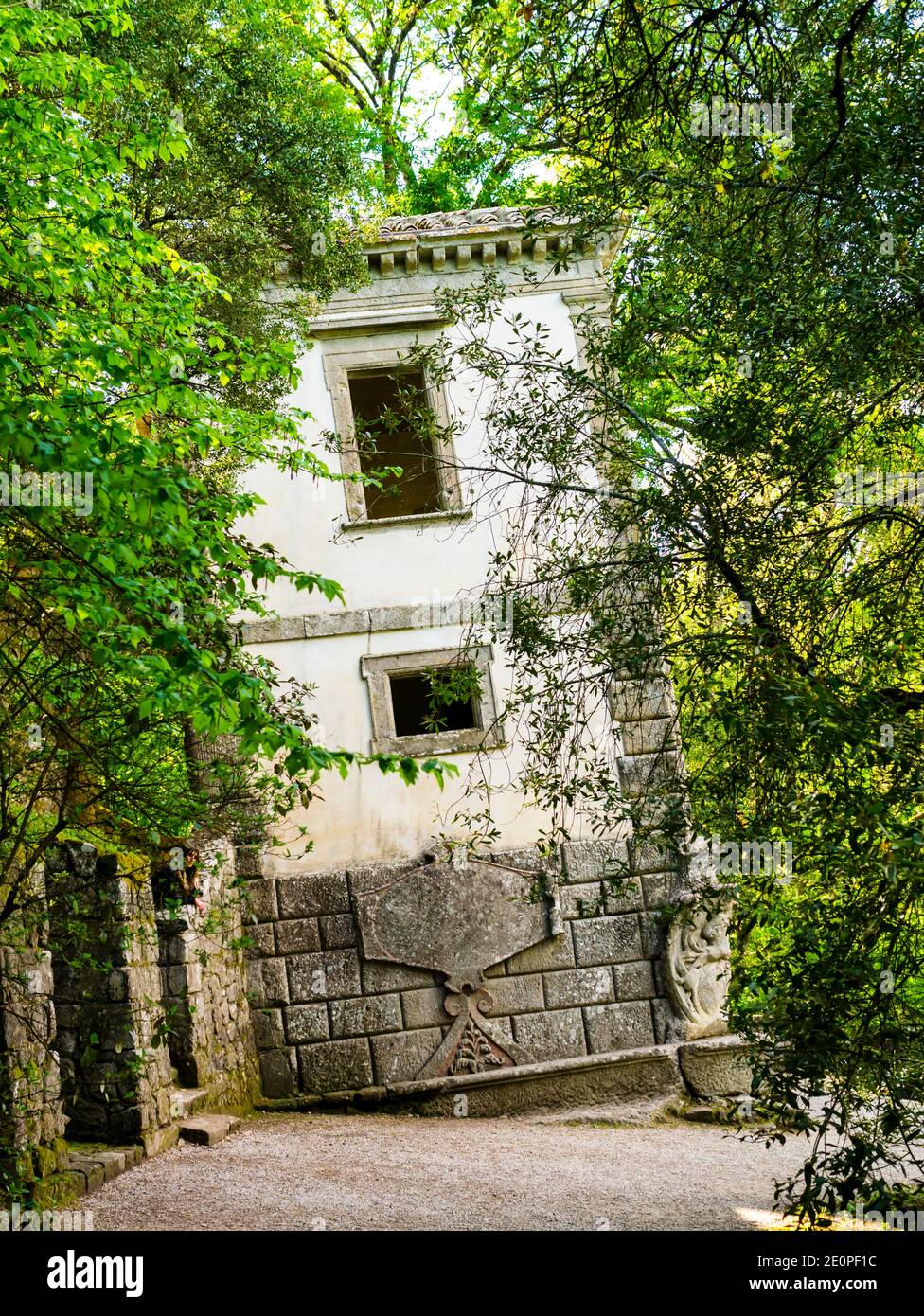 Leaning house in the mysterious Sacred Grove, Bomarzo Gardens, province ...