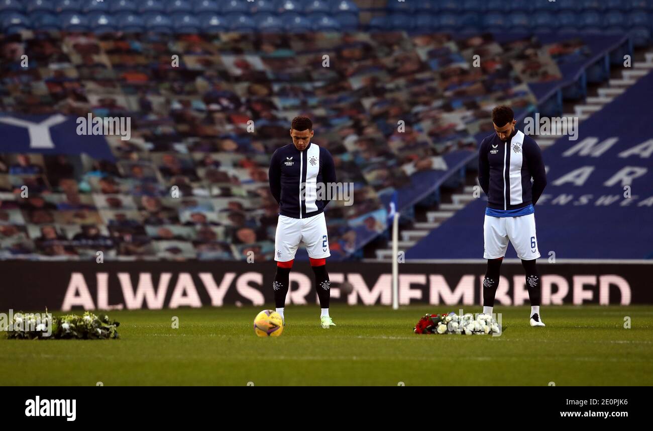 Rangers James Tavernier and Connor Goldson (right) observe the minutes ...