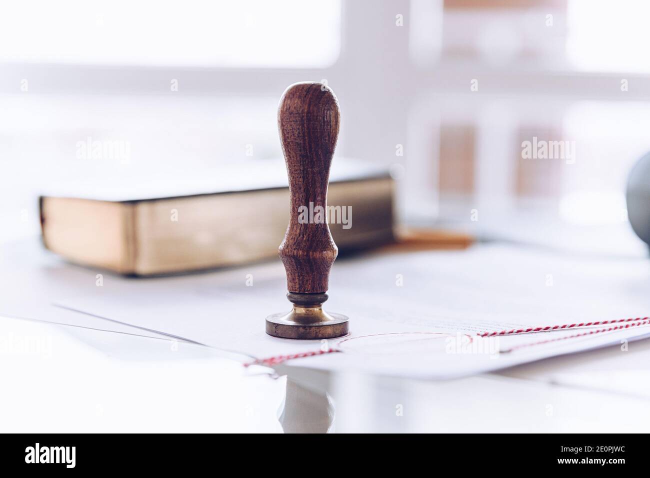 Notary stamp on a table in a notary's office Stock Photo - Alamy