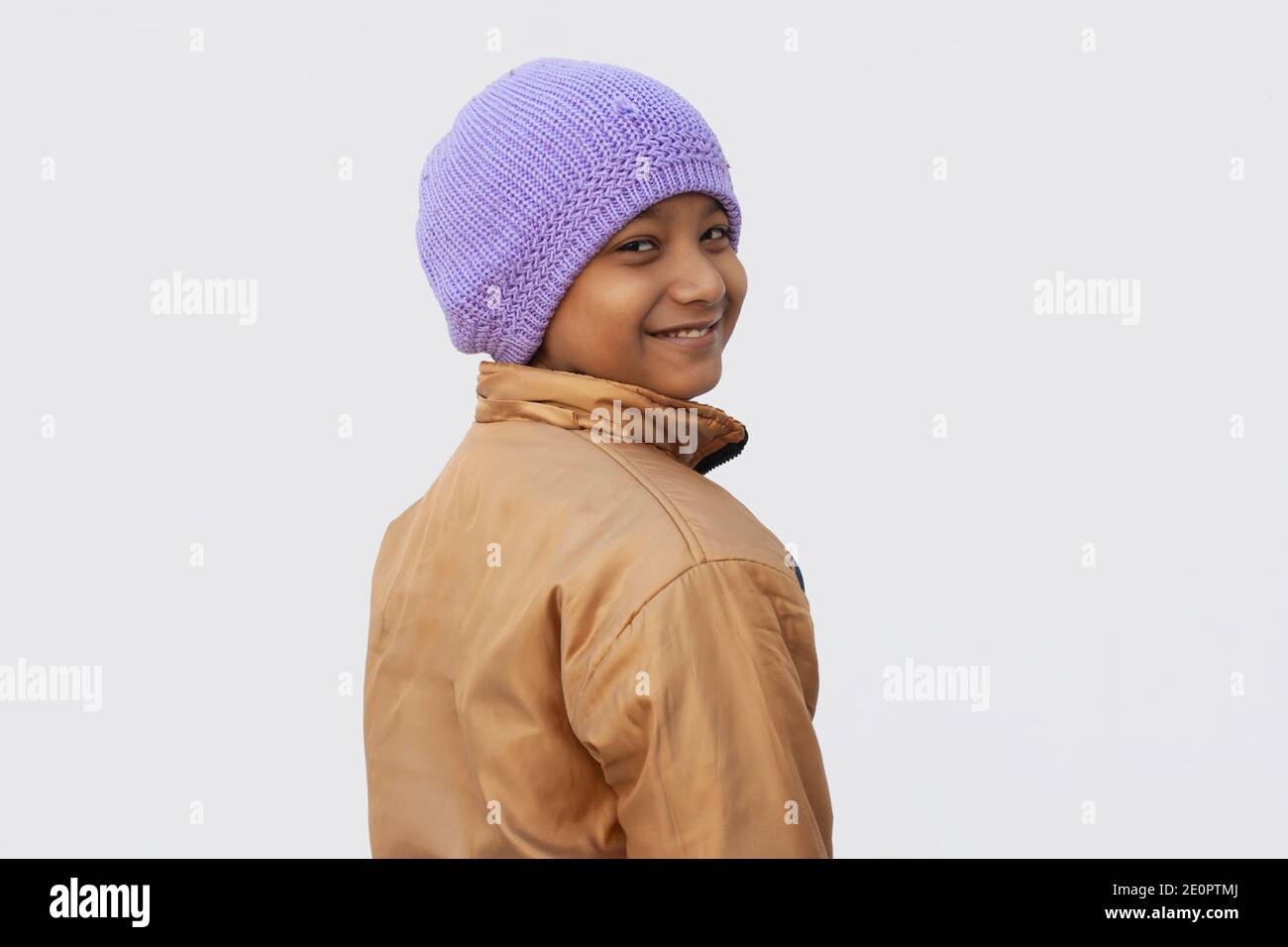 Back view of boy wearing warm clothing during winter Stock Photo - Alamy