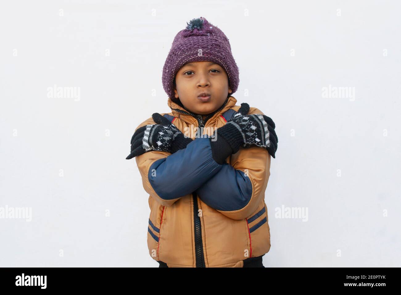 Boy shivering winter clothing hi-res stock photography and images - Alamy