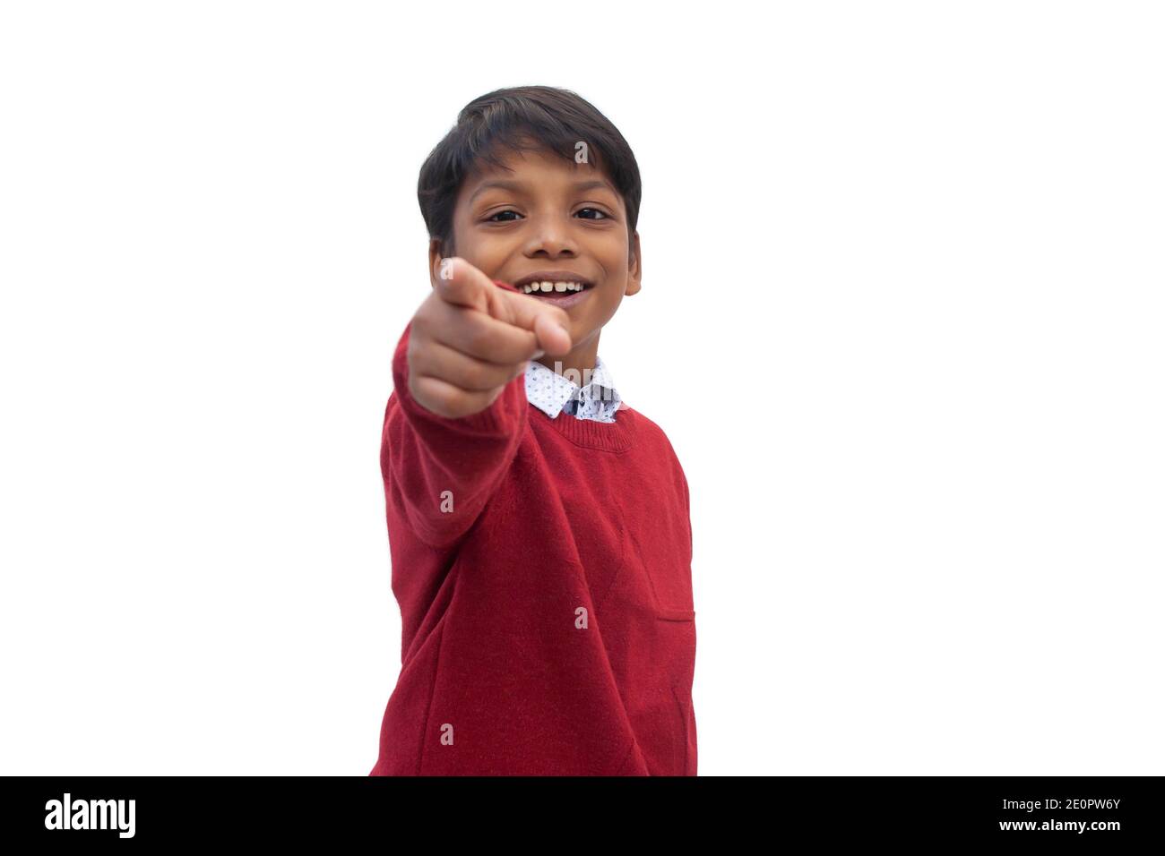 "Portrait of boy Pointing Out With A Finger wearing warm clothing Stock ...