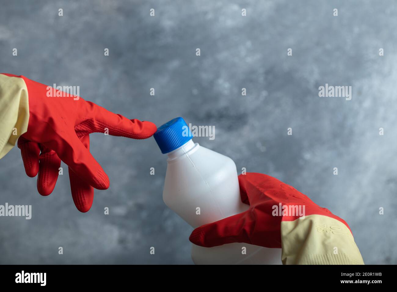 Bleach bottle gloves hi-res stock photography and images - Alamy