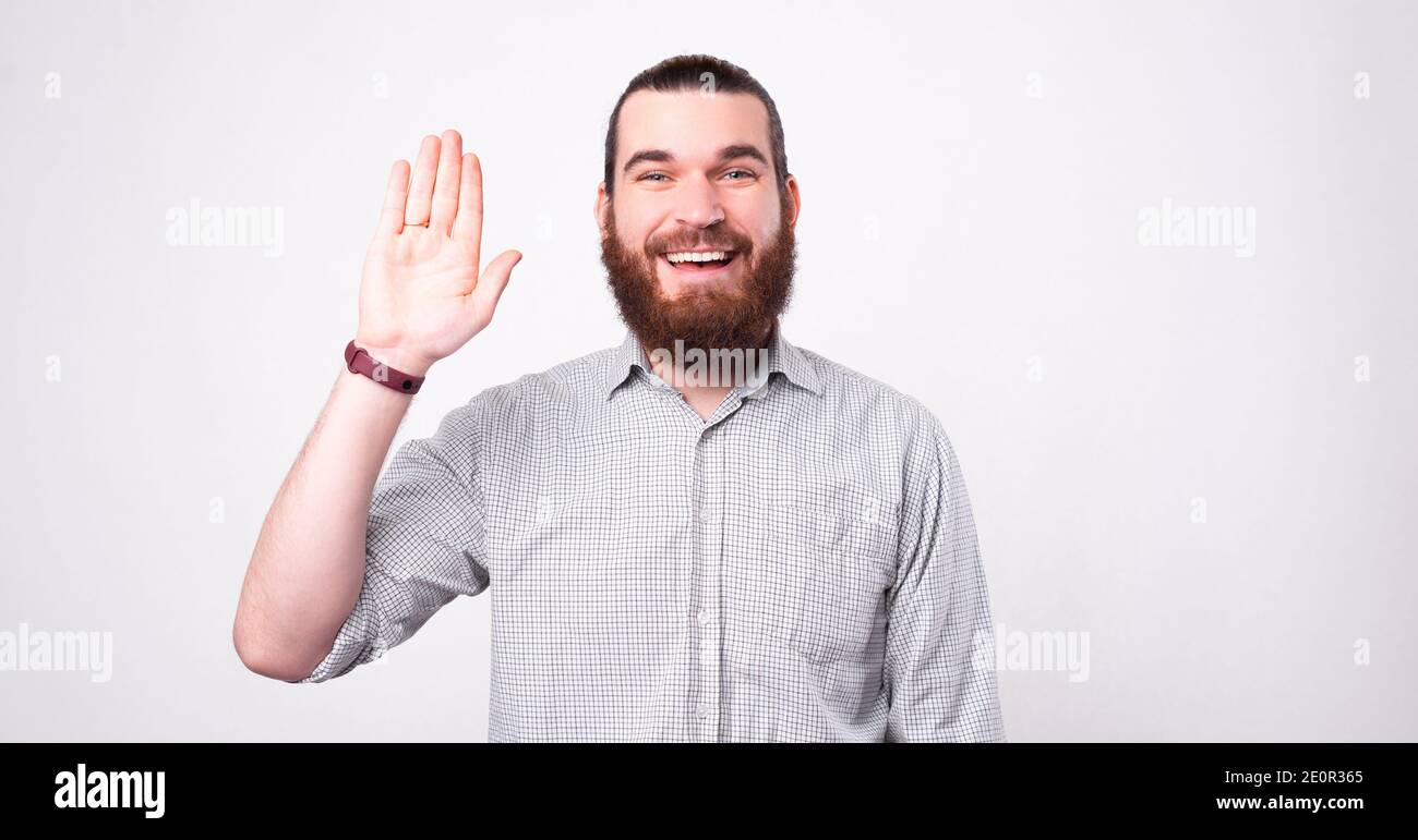 Boy waving goodbye to a man hi-res stock photography and images - Alamy
