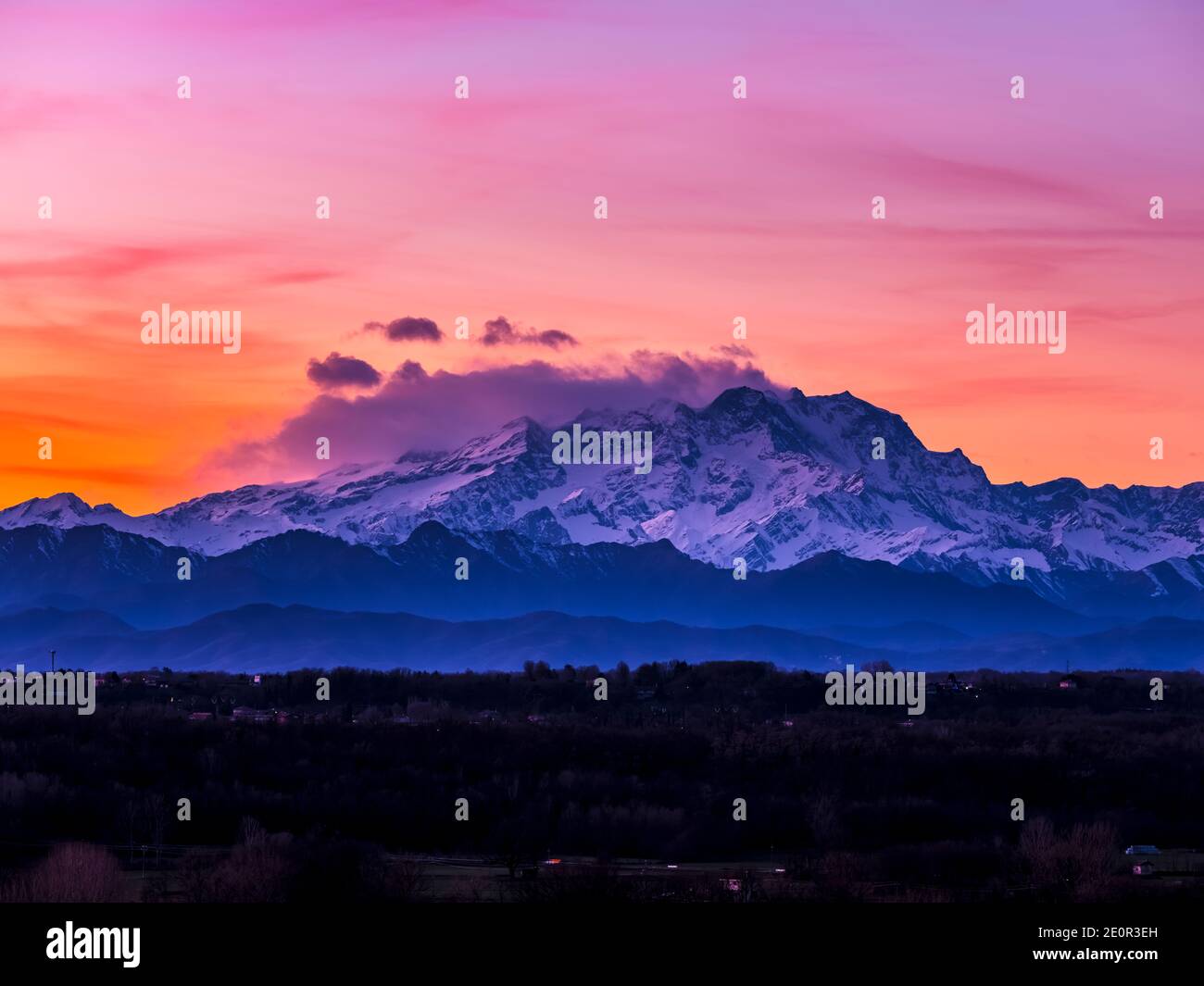 View of the Lombard Alps, the Monte Rosa chain shrouded in clouds at ...