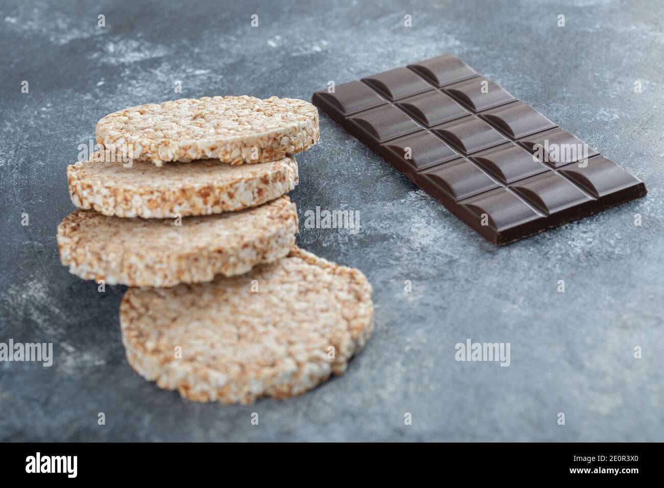 Delicious puffed rice bread with bar of chocolate Stock Photo - Alamy