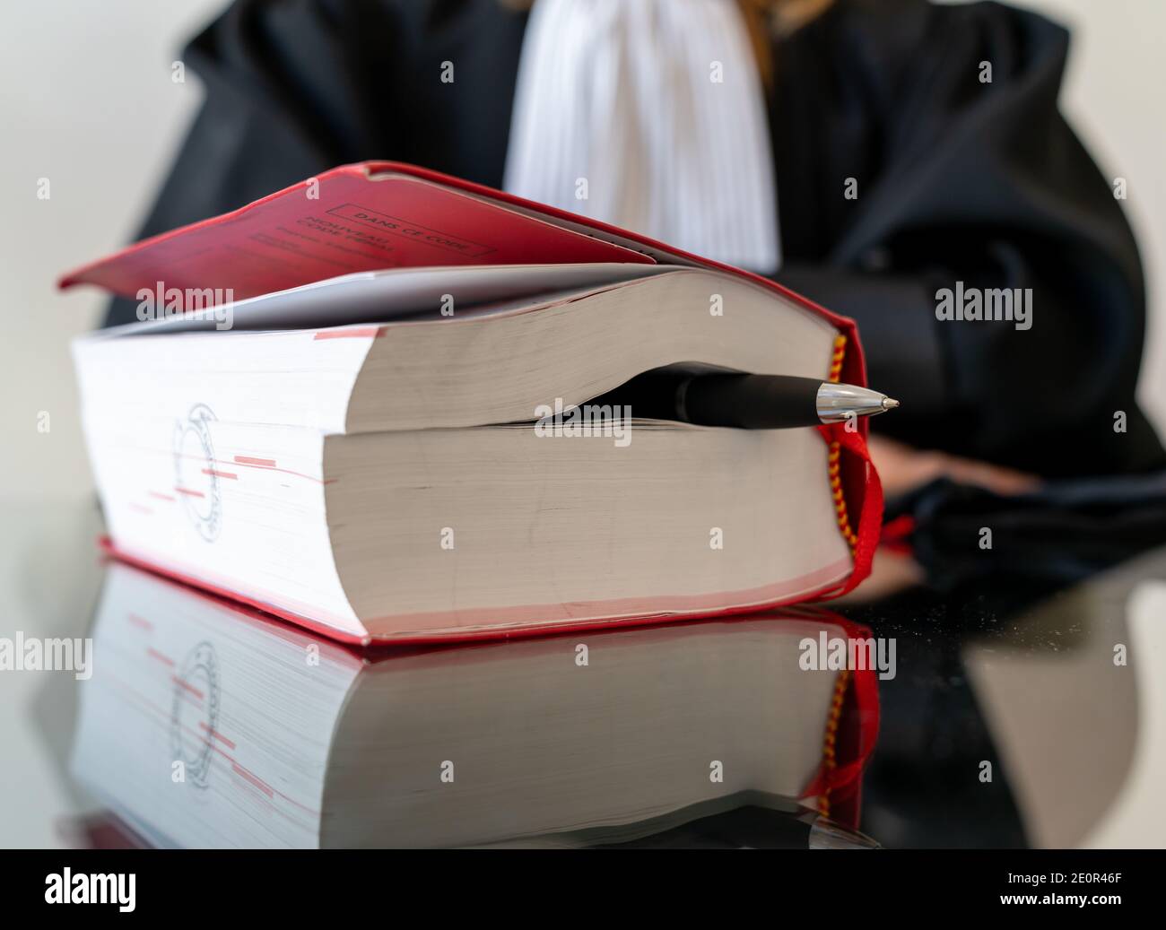 Law, French lawyer woman sitting with french red law book Stock Photo ...