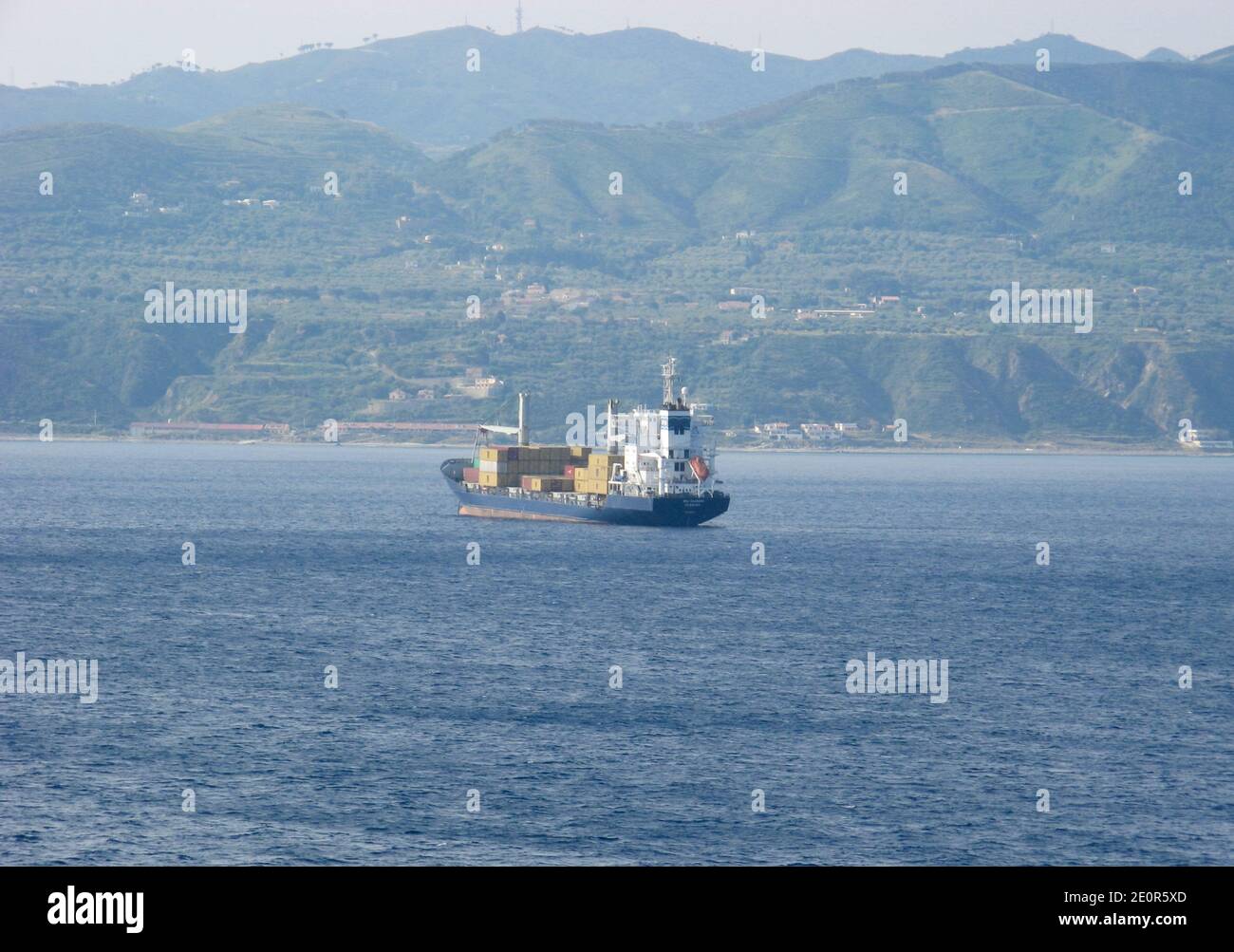 Container Cargo Ship Heading toward Messina Port in Sicily Italy Stock ...
