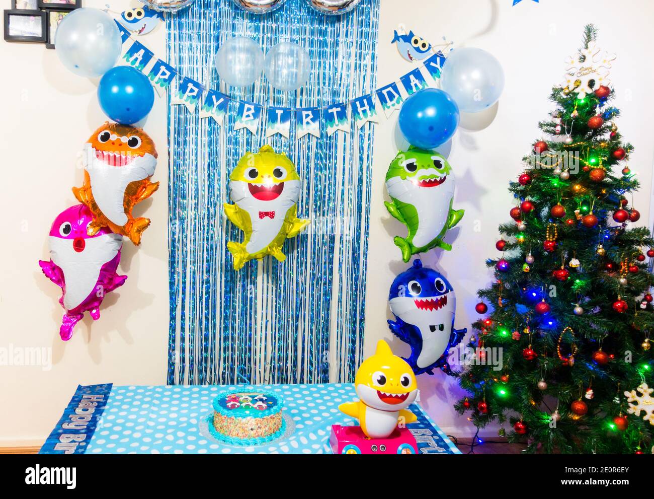 Children baby shark themed birthday celebration decorations Stock Photo ...