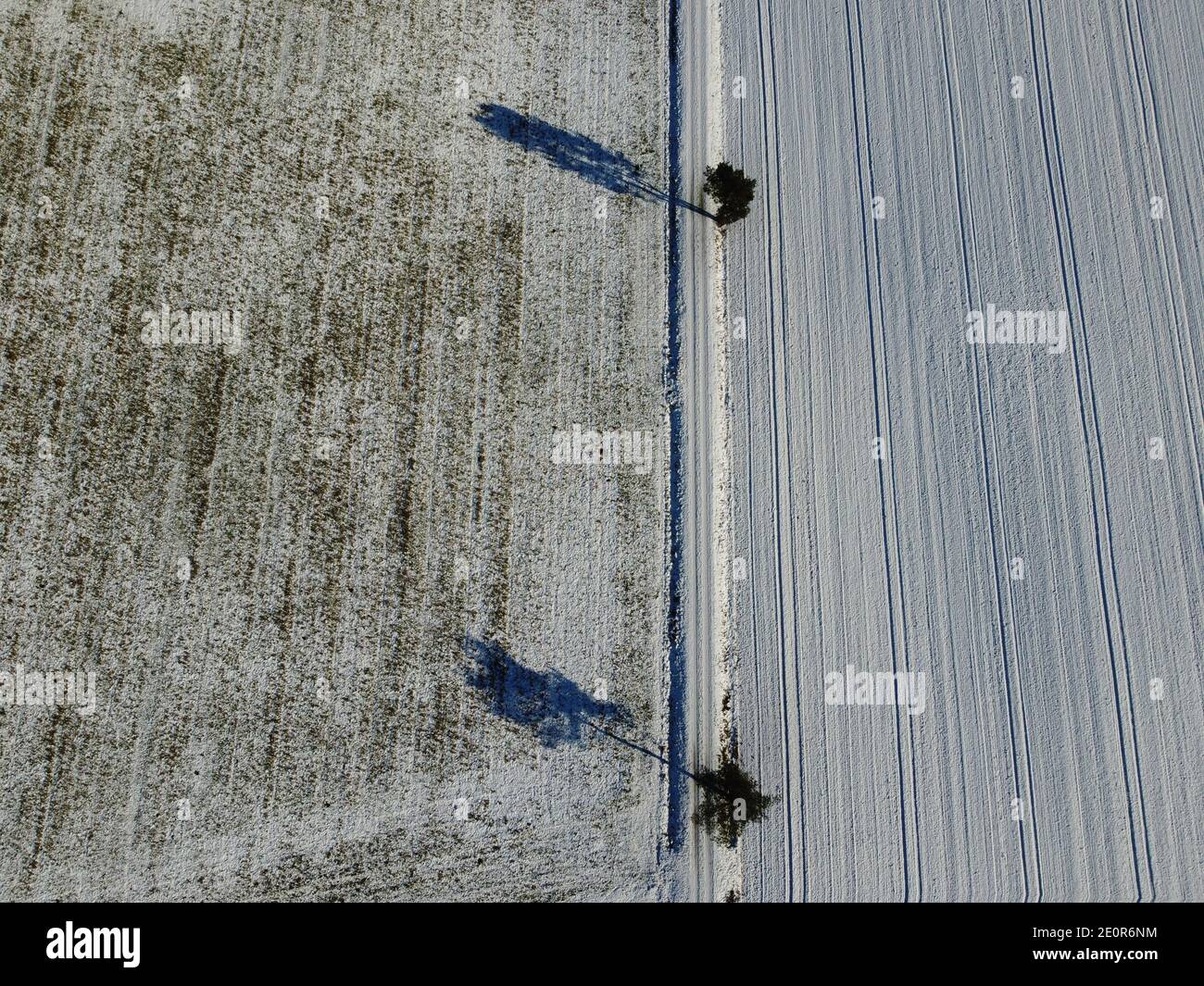 Top down view of a path leading through snow covered fields Stock Photo ...