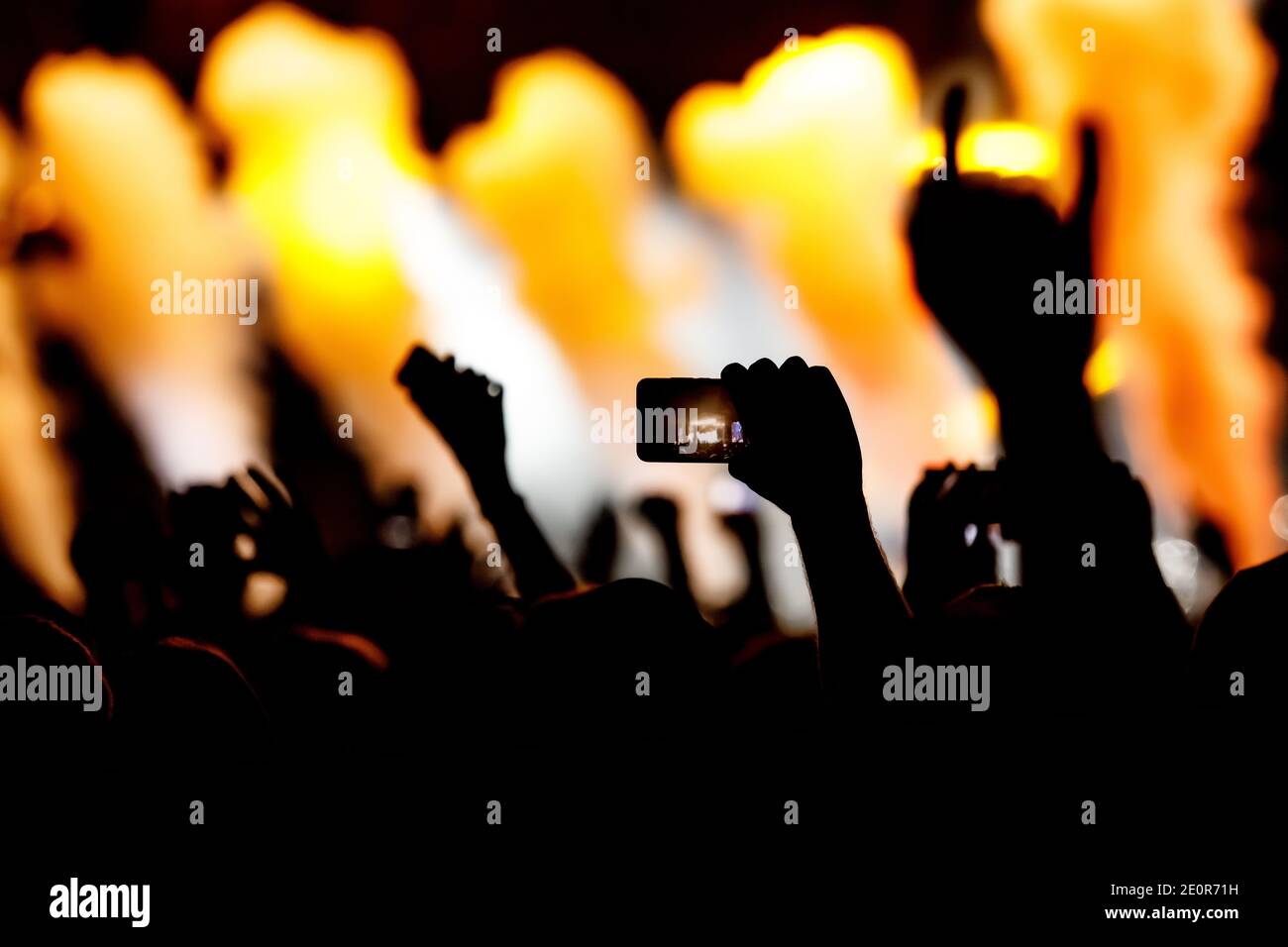 Crowd at a concert. Hands and smartphones in front of the stage Stock ...