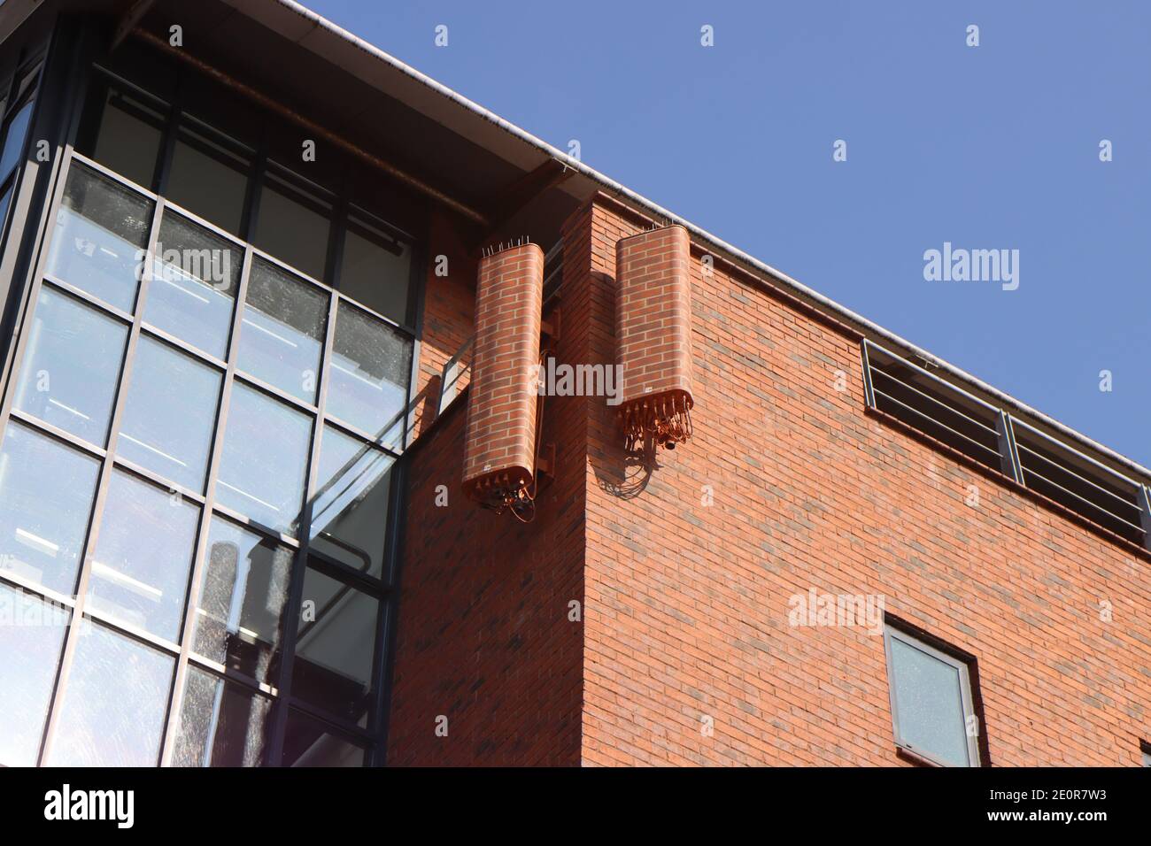 A 4G and 5G mobile phone mast disguised as the bricks of the building ...
