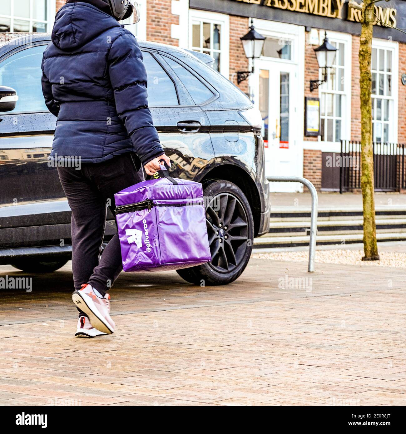 London UK, January 02 2021, Deliveroo Home Delivery Driver Carrying A ...