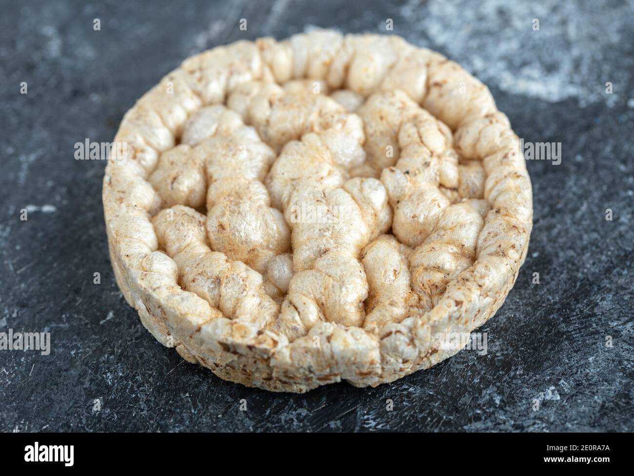 Organic round crispbread on marble background Stock Photo - Alamy
