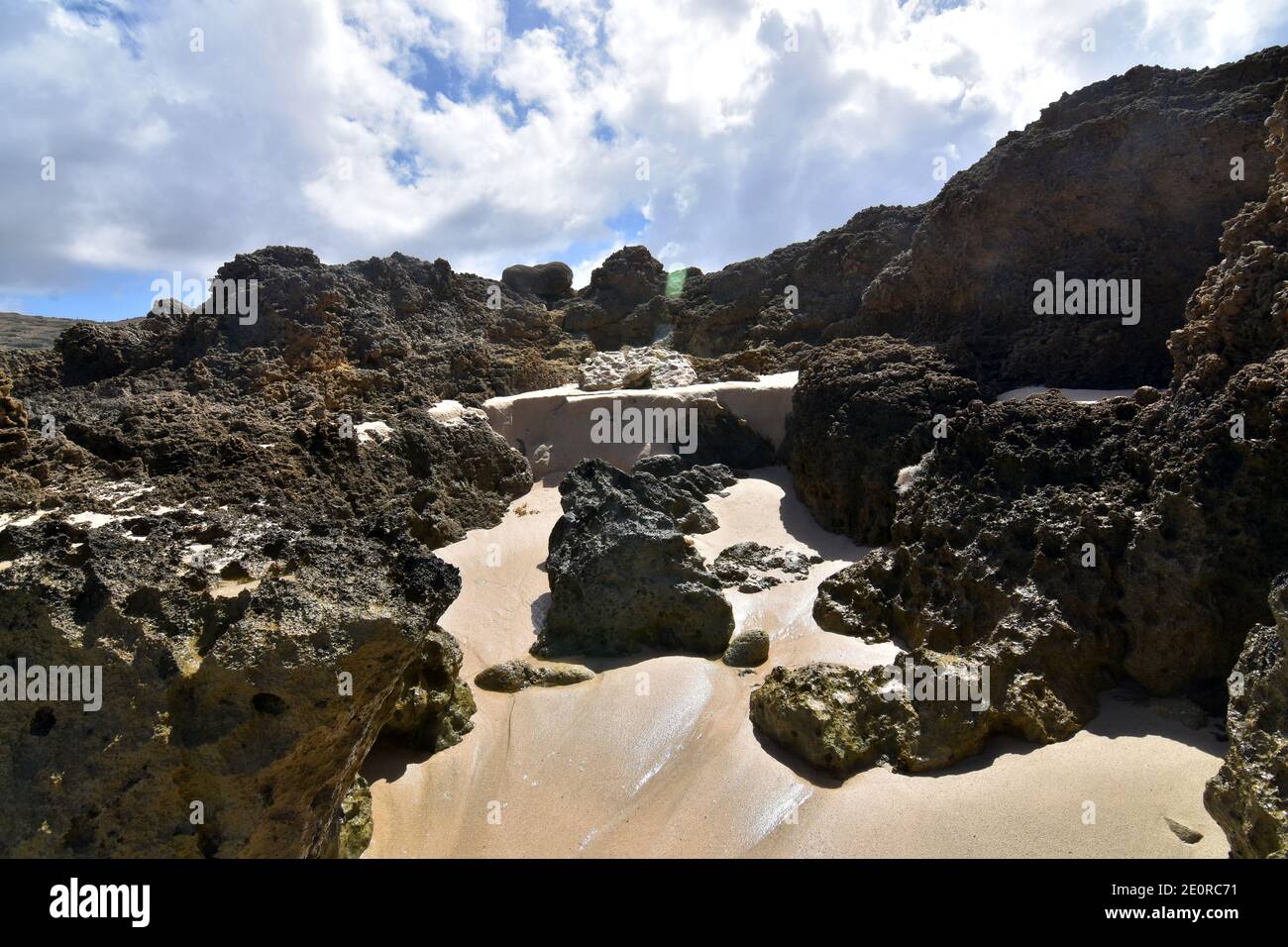 Scenic rugged and rough lava rock formation in Aruba Stock Photo - Alamy
