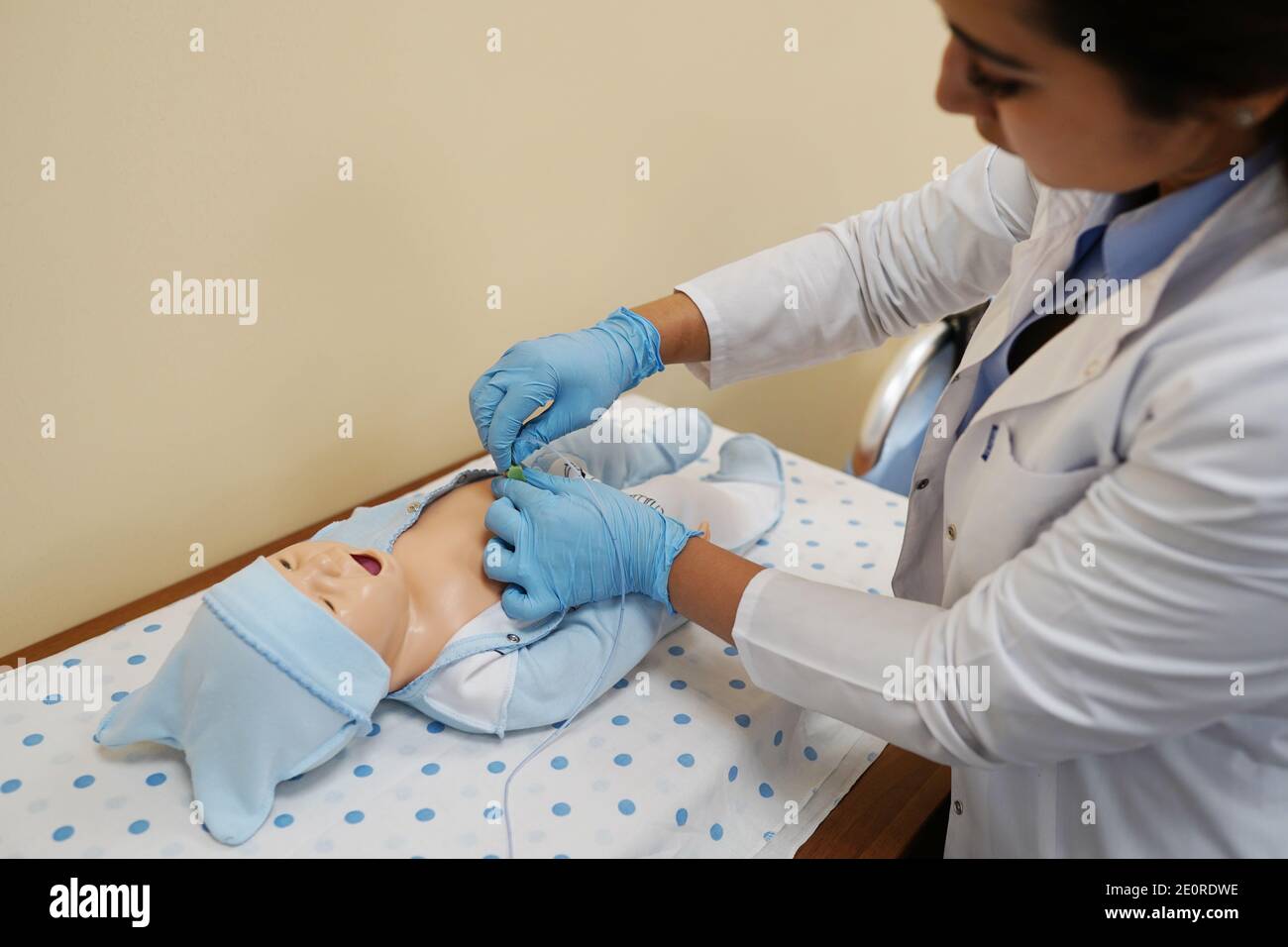 medical training on a simulation mannequin baby Stock Photo - Alamy
