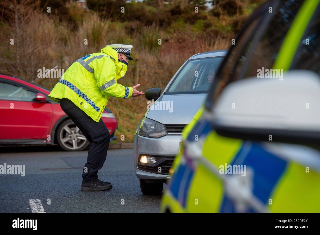 31.12.20 - Police officers from Dyfed Powys talk to walkers at the Pont ...