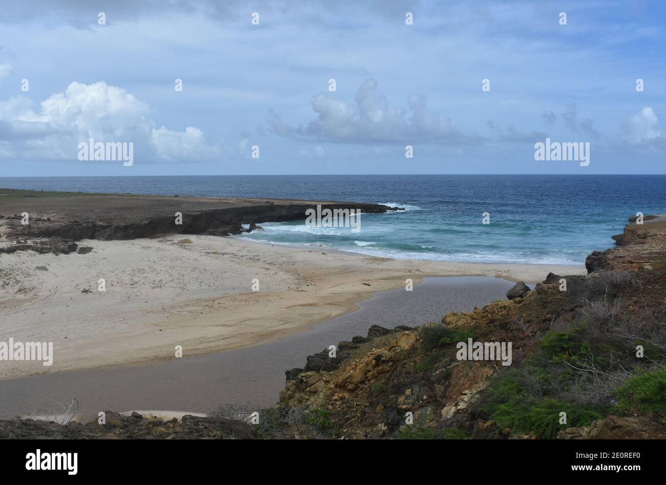 Scenic coastal landscape with a beach in Aruba Stock Photo - Alamy