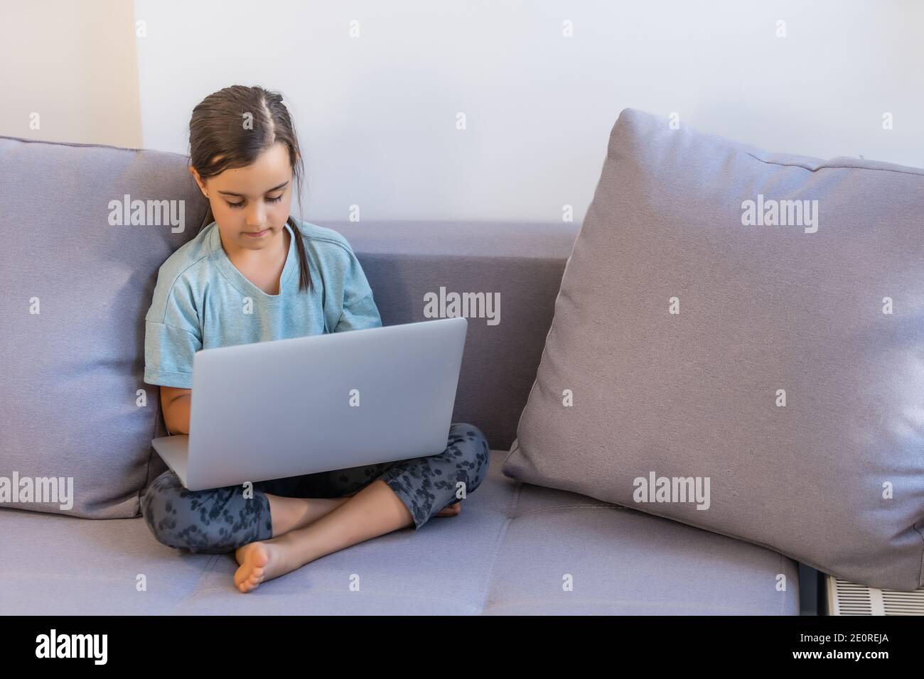 Little Girl Using Digital Laptop E-learning Concept. little girl ...