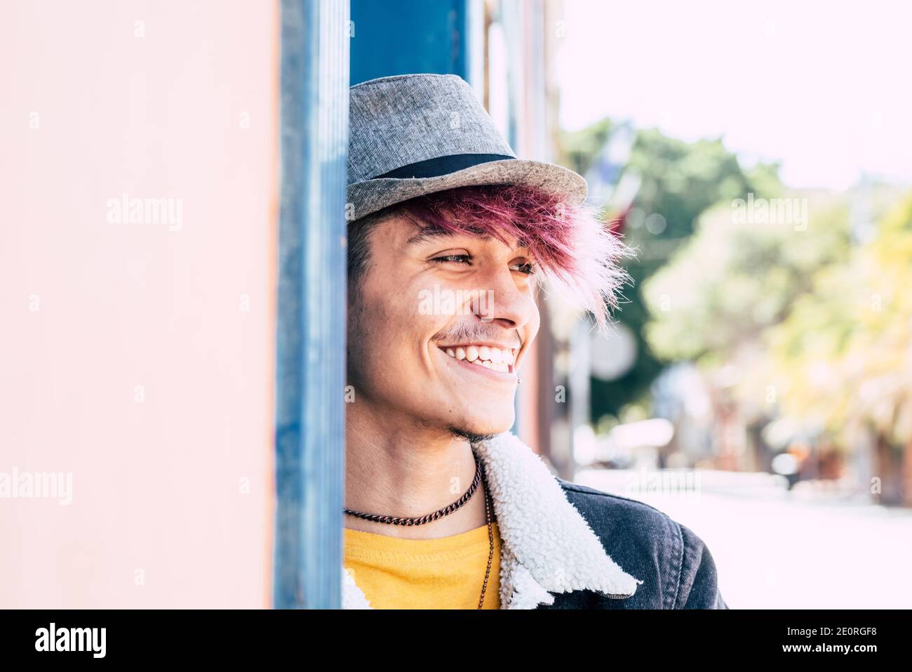 Happy cheerful young alternative teenager smile outdoor in diversity ...