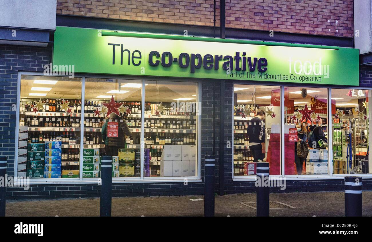 The Co-op (Co-operative) supermarket in the early evening. Lights on ...