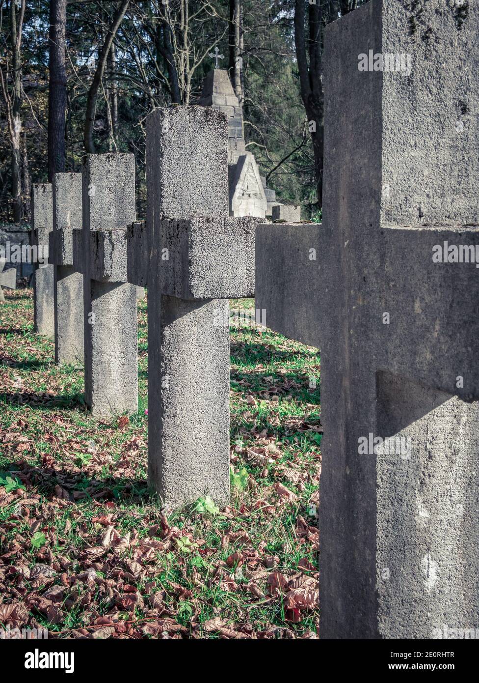 Aligned solid stone crosses in a cemetery Stock Photo - Alamy