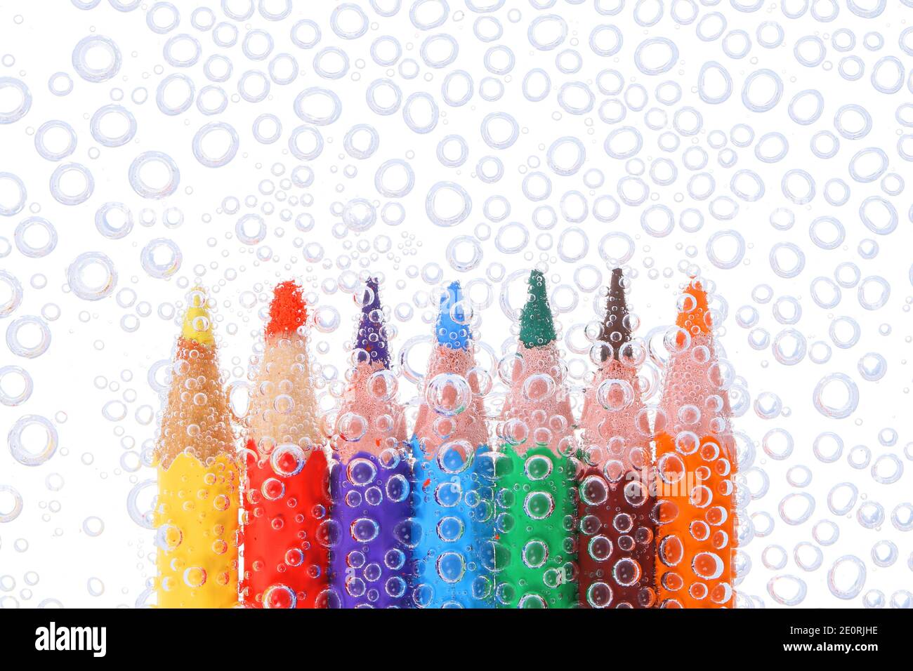 Colored pencils in air bubbles Stock Photo - Alamy