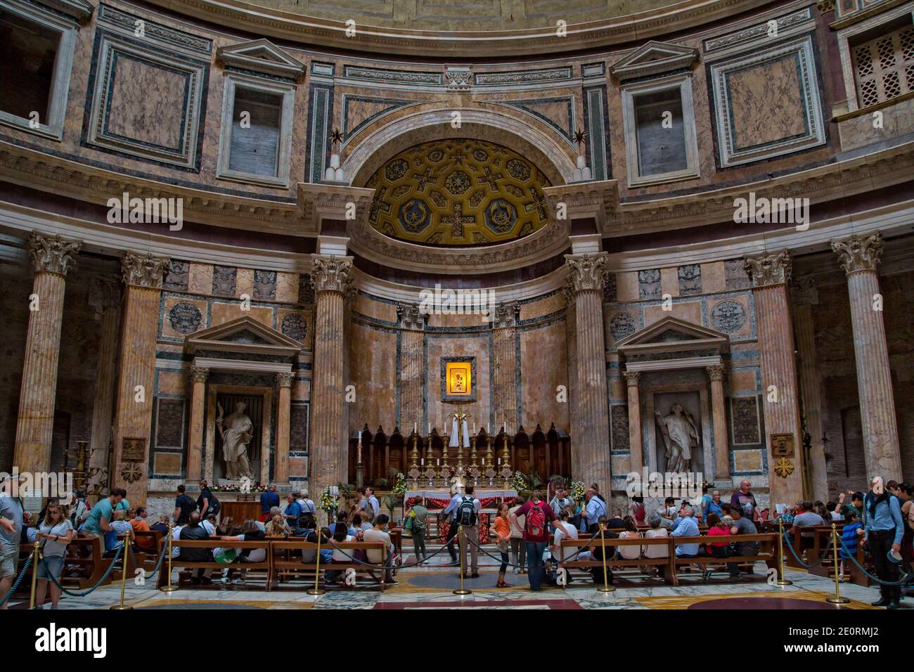 Tourists inside the Pantheon in Rome. The Pantheon is a ancient Roman ...