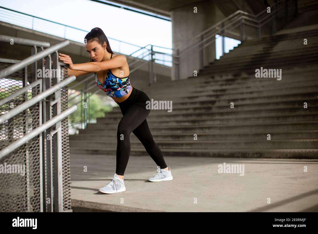 Pretty young woman exercise in hi-res stock photography and images - Alamy