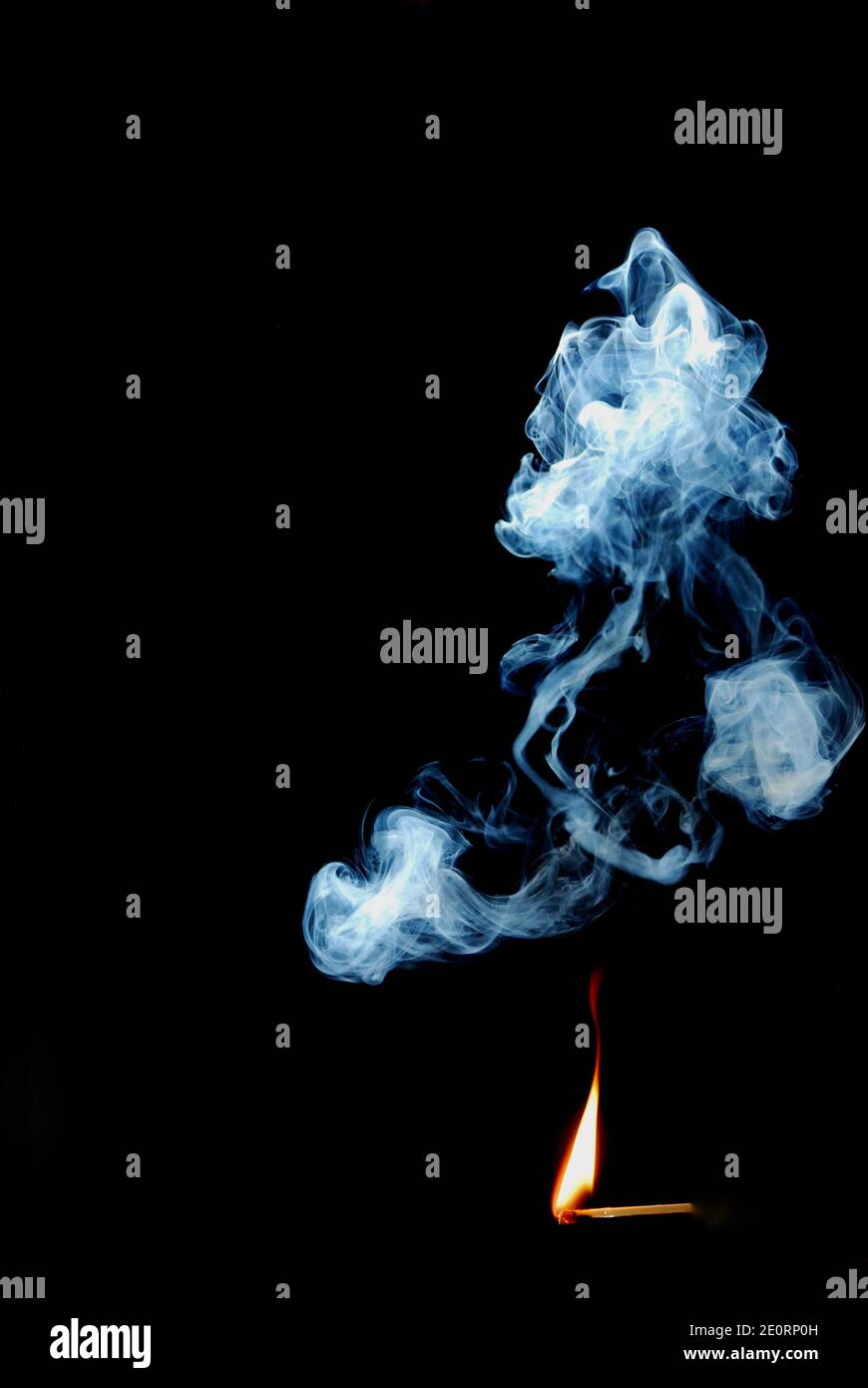blue gray smoke with lots of turbulences and flame from match Stock ...