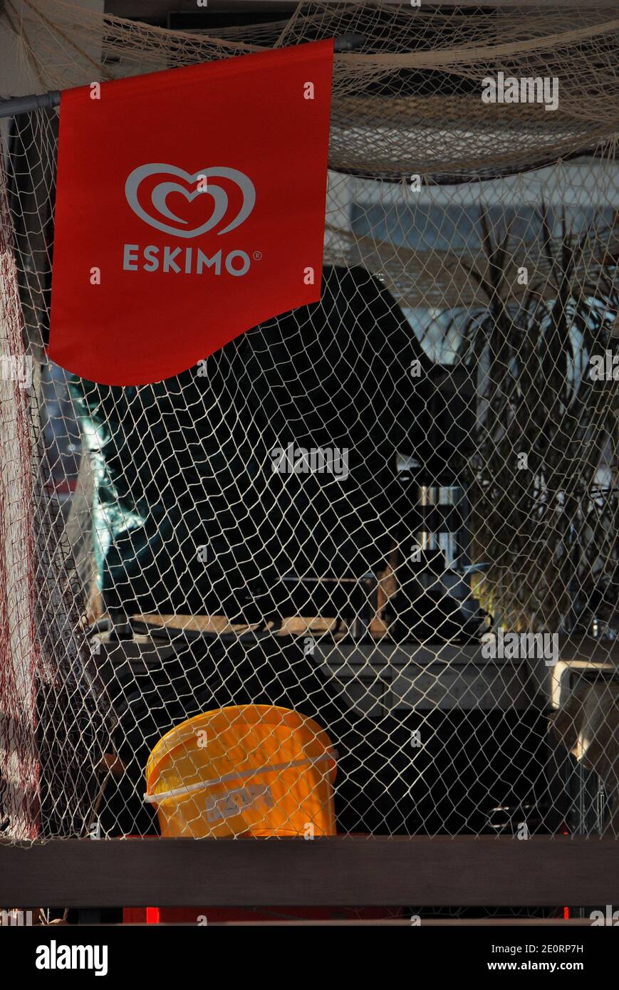 eskimo flag and fishing net in holidays and summer Stock Photo - Alamy