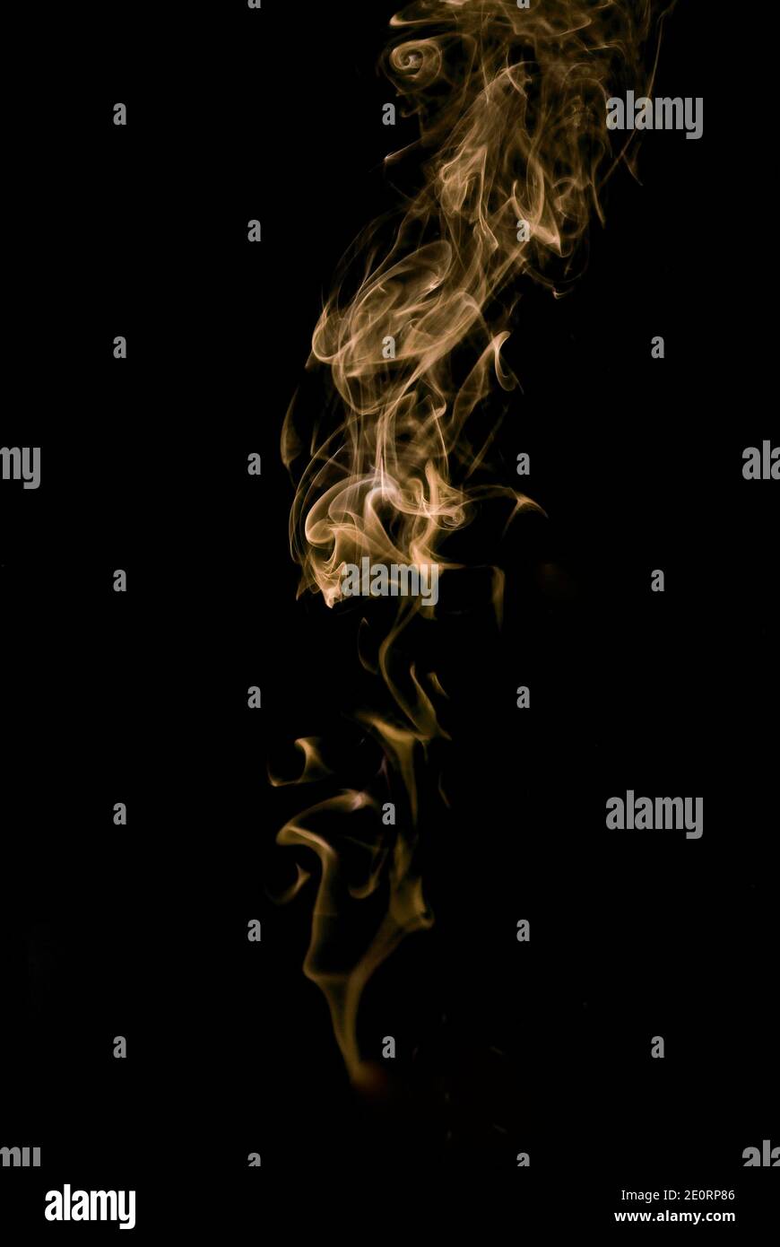 bright golden brown smoke on black background Stock Photo - Alamy