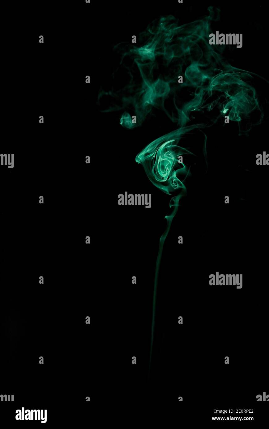 delicate light green smoke on black background Stock Photo - Alamy